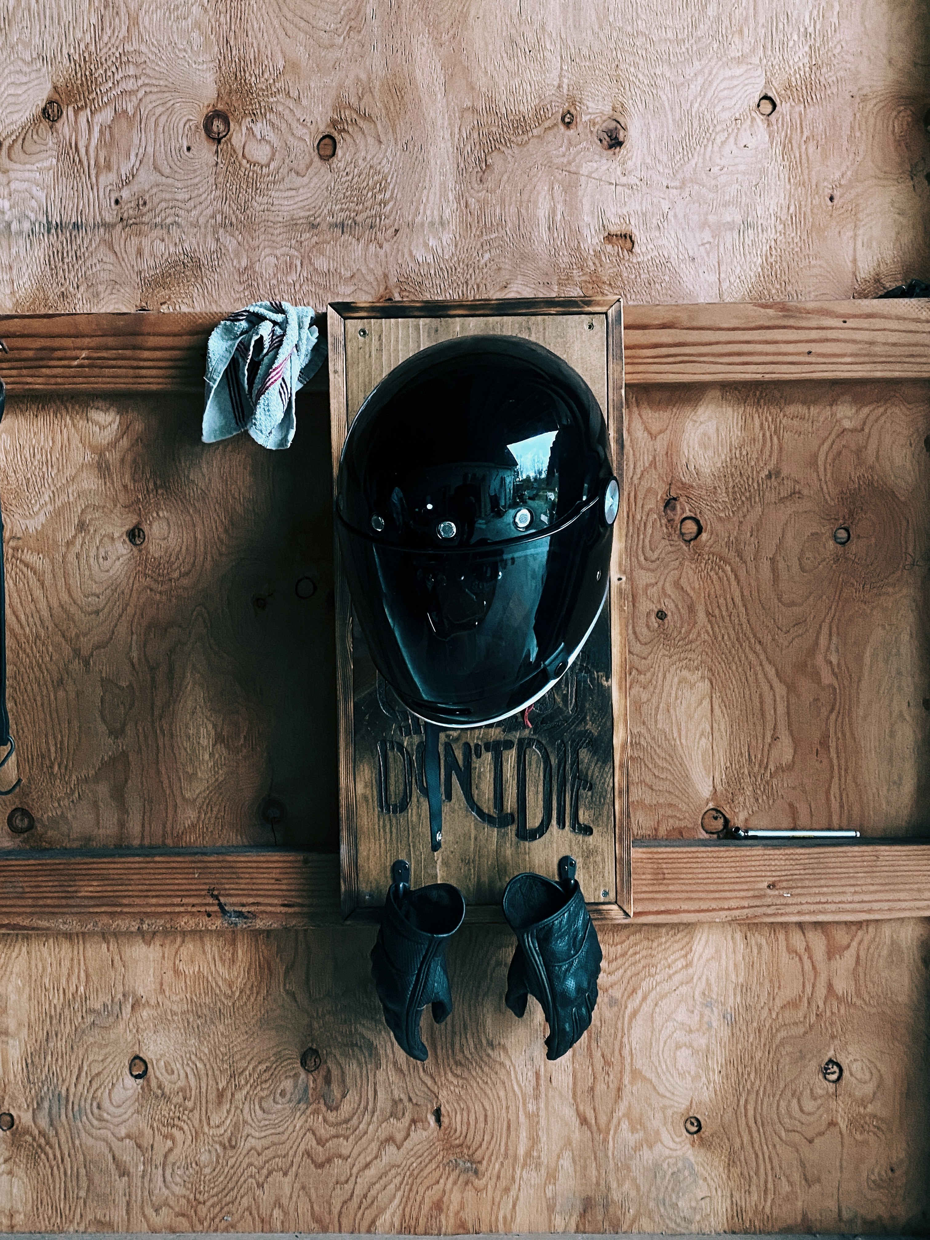 Helmeted Shadow in a Wooden Workshop