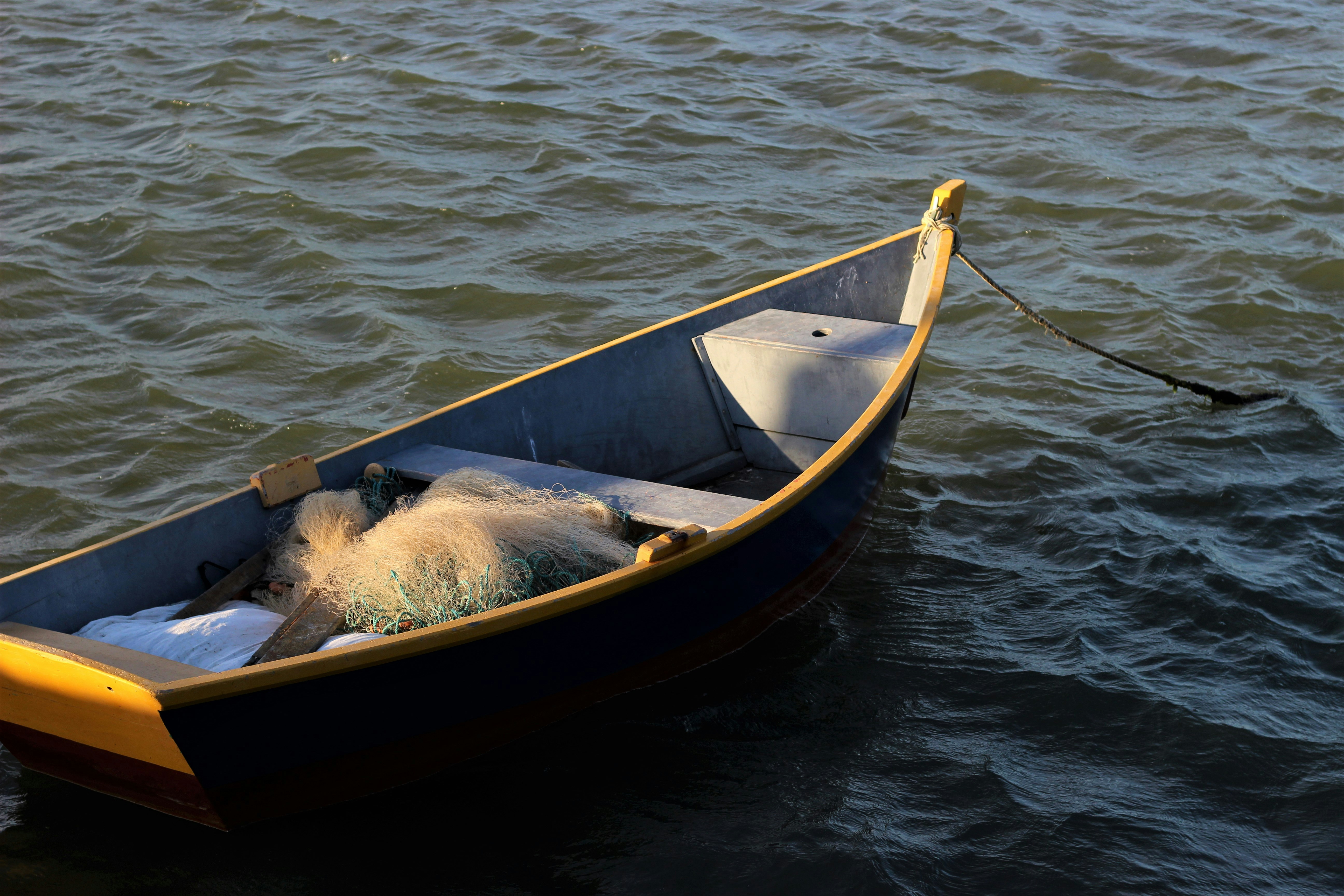 Brown and black boat on body of water during daytime photo – Free ...