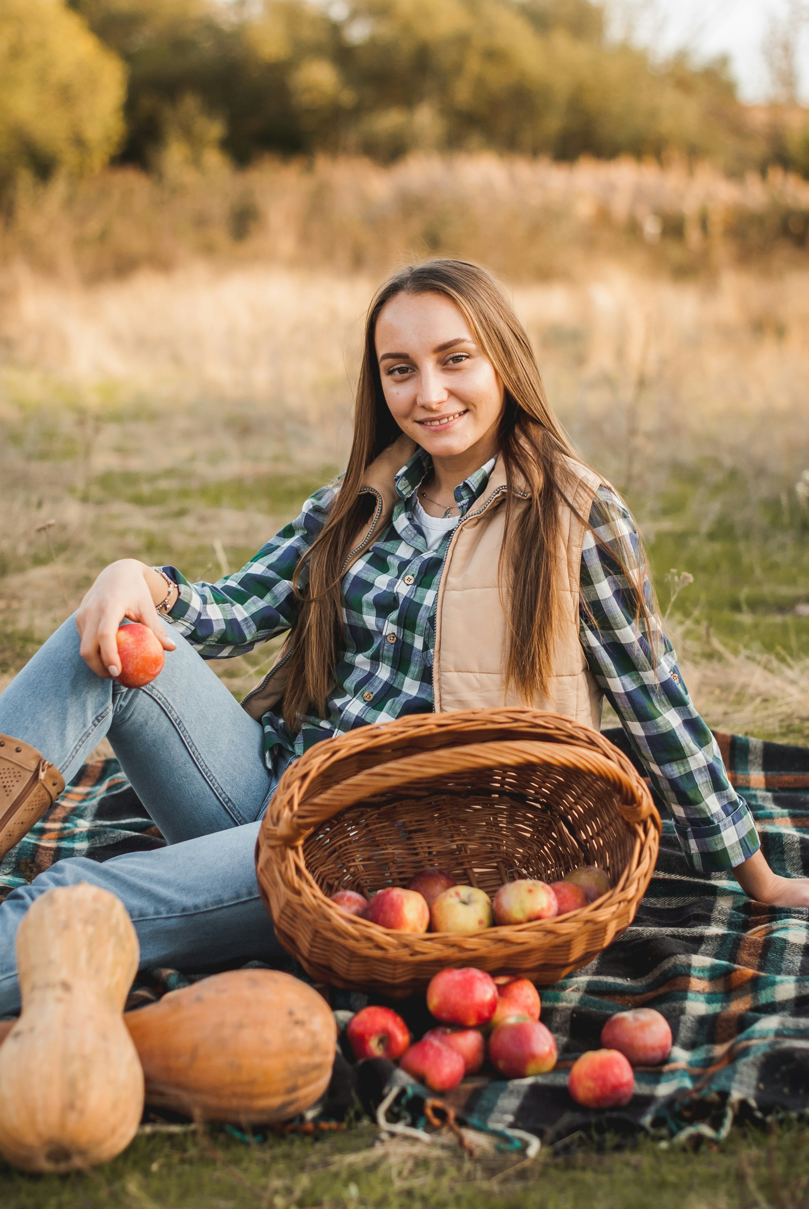 Autumn Picnic: A Sunny Portrait Among Harvest Apples