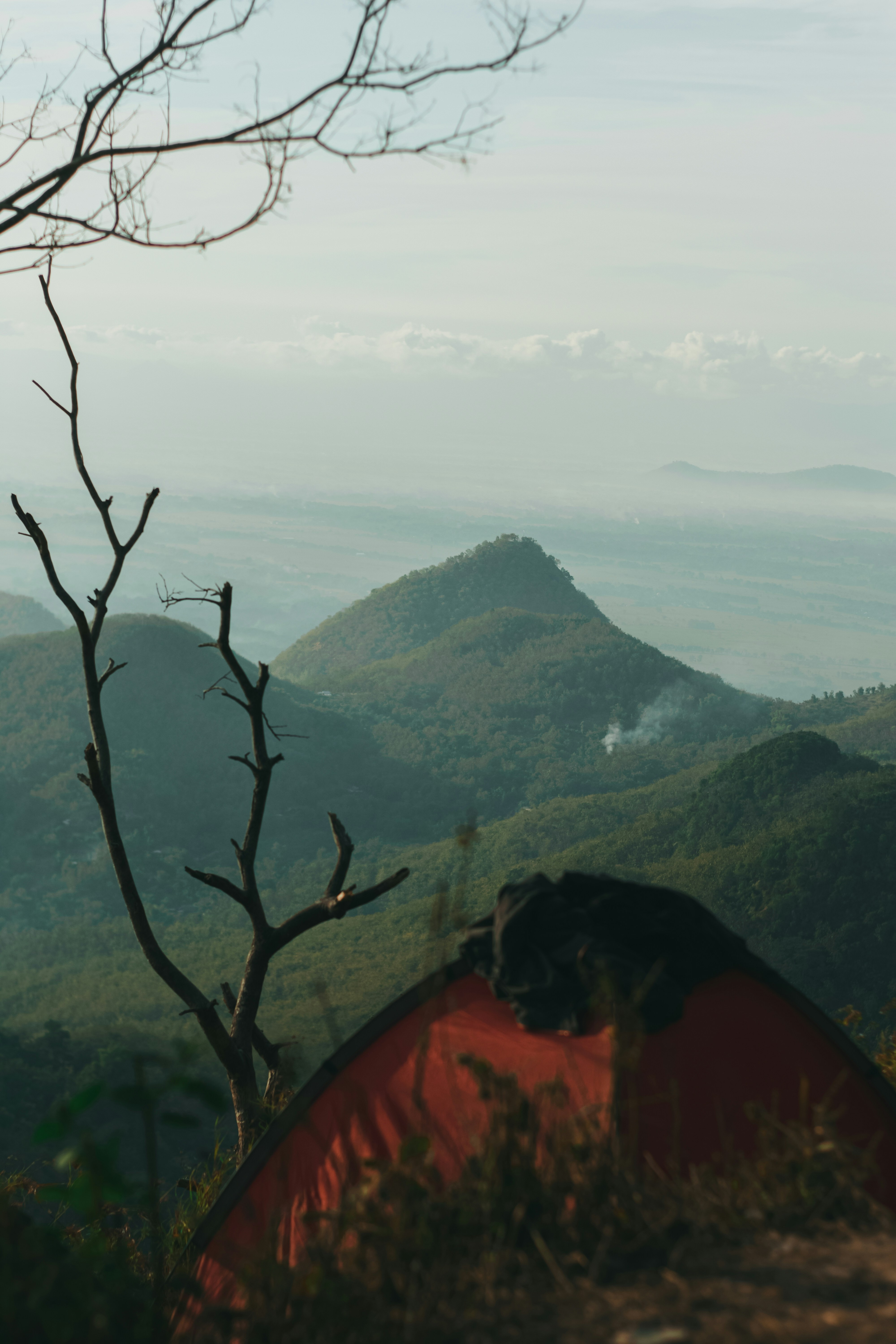 Red Tent on a Misty Ridge