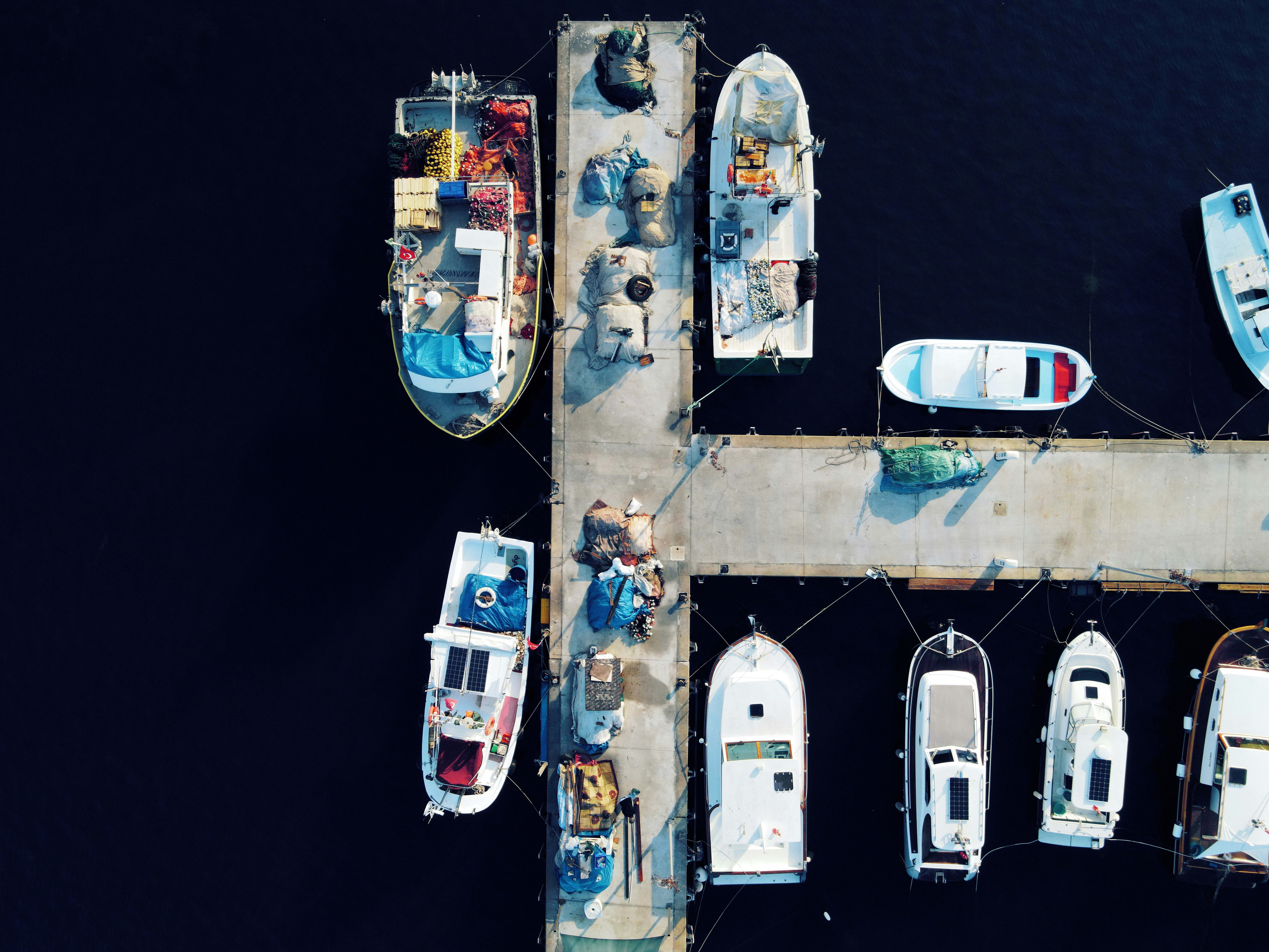 Marina Grid: Aerial Study of Docks, Boats, and Quiet Motion