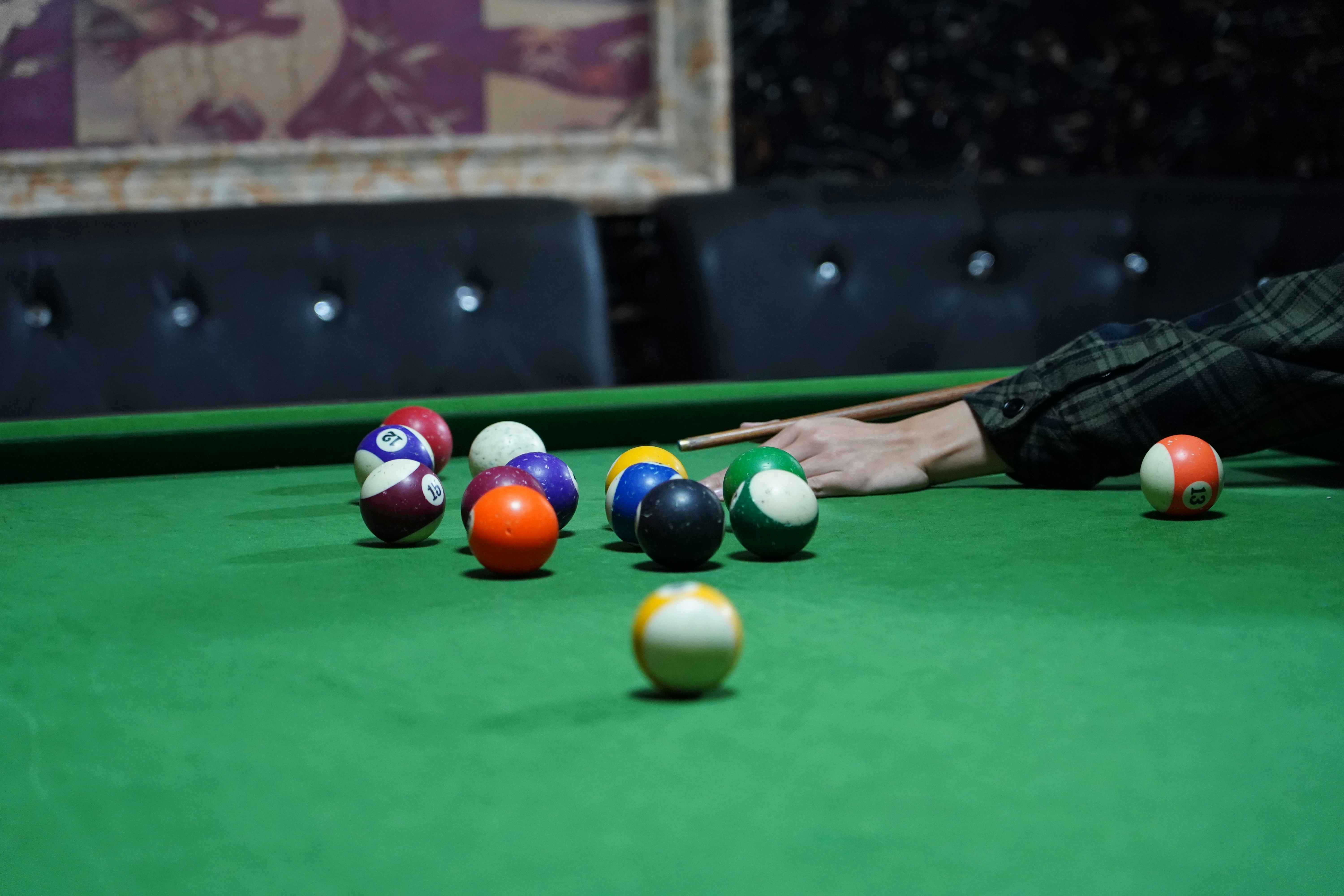 Billiard balls on billiard table photo – Free Human Image on Unsplash