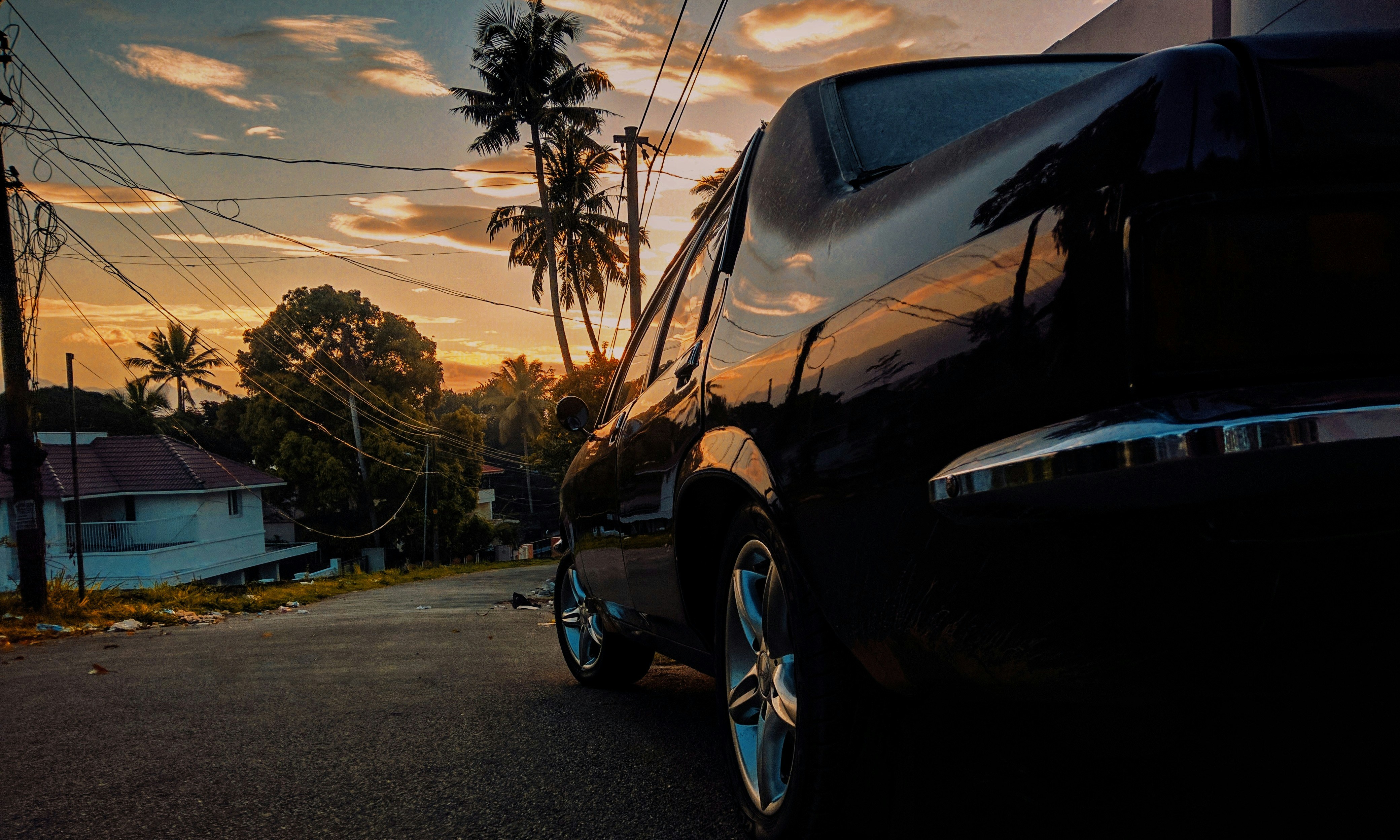 Black car on gray asphalt road during sunset photo – Free Car Image on ...