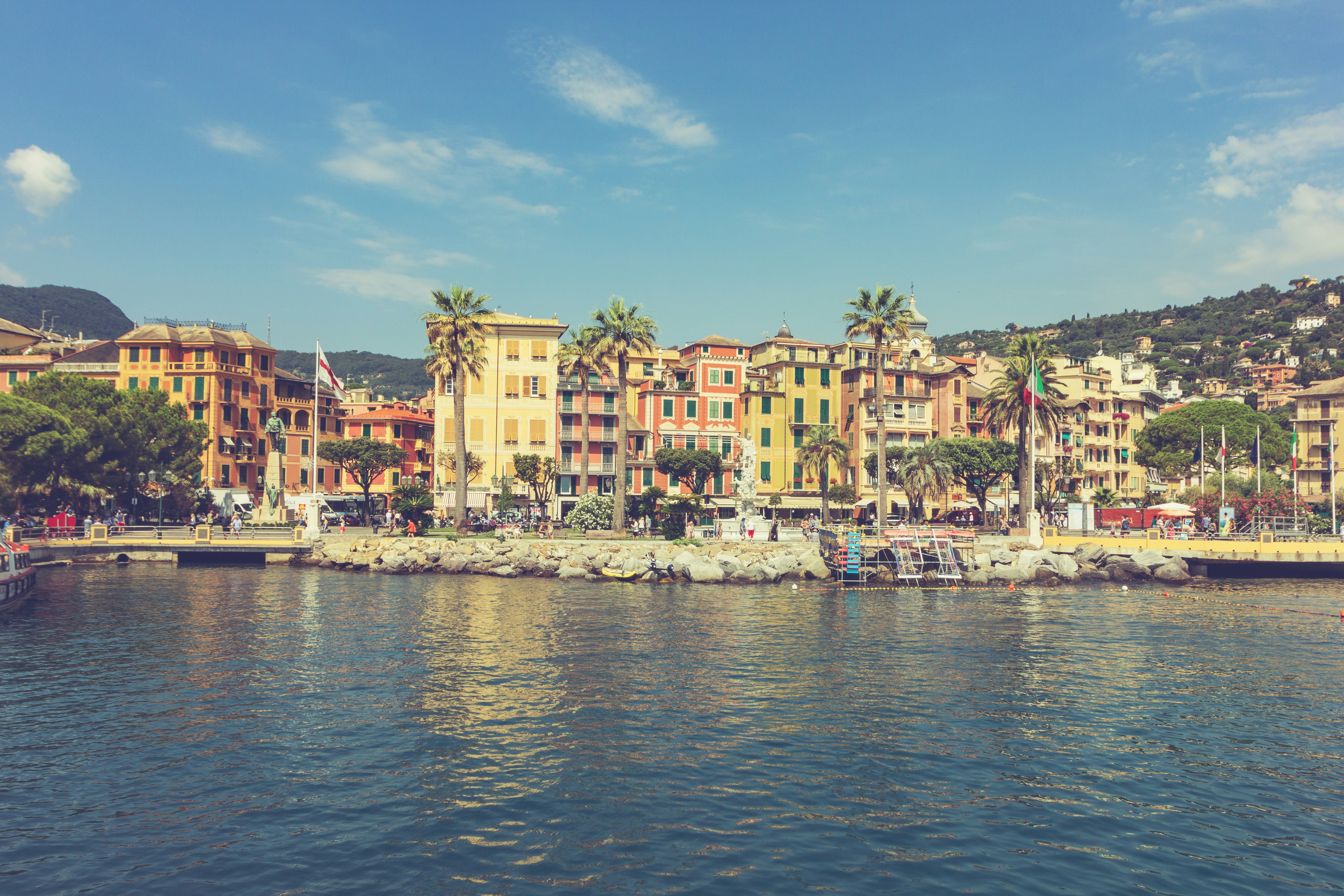 body of water near buildings during daytime