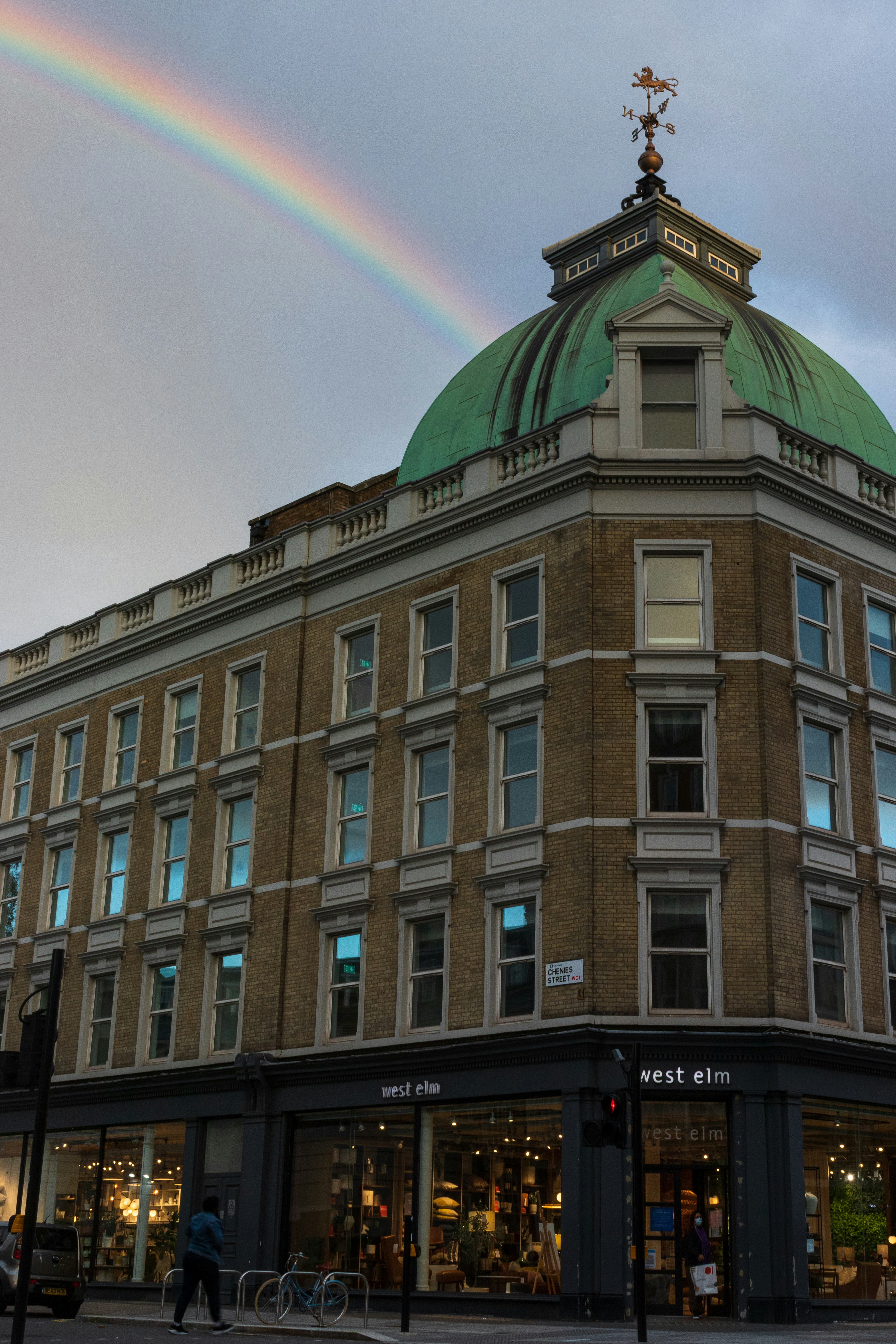 Rainbow Over the Green-Domed Corner: Brick Facade and West Elm