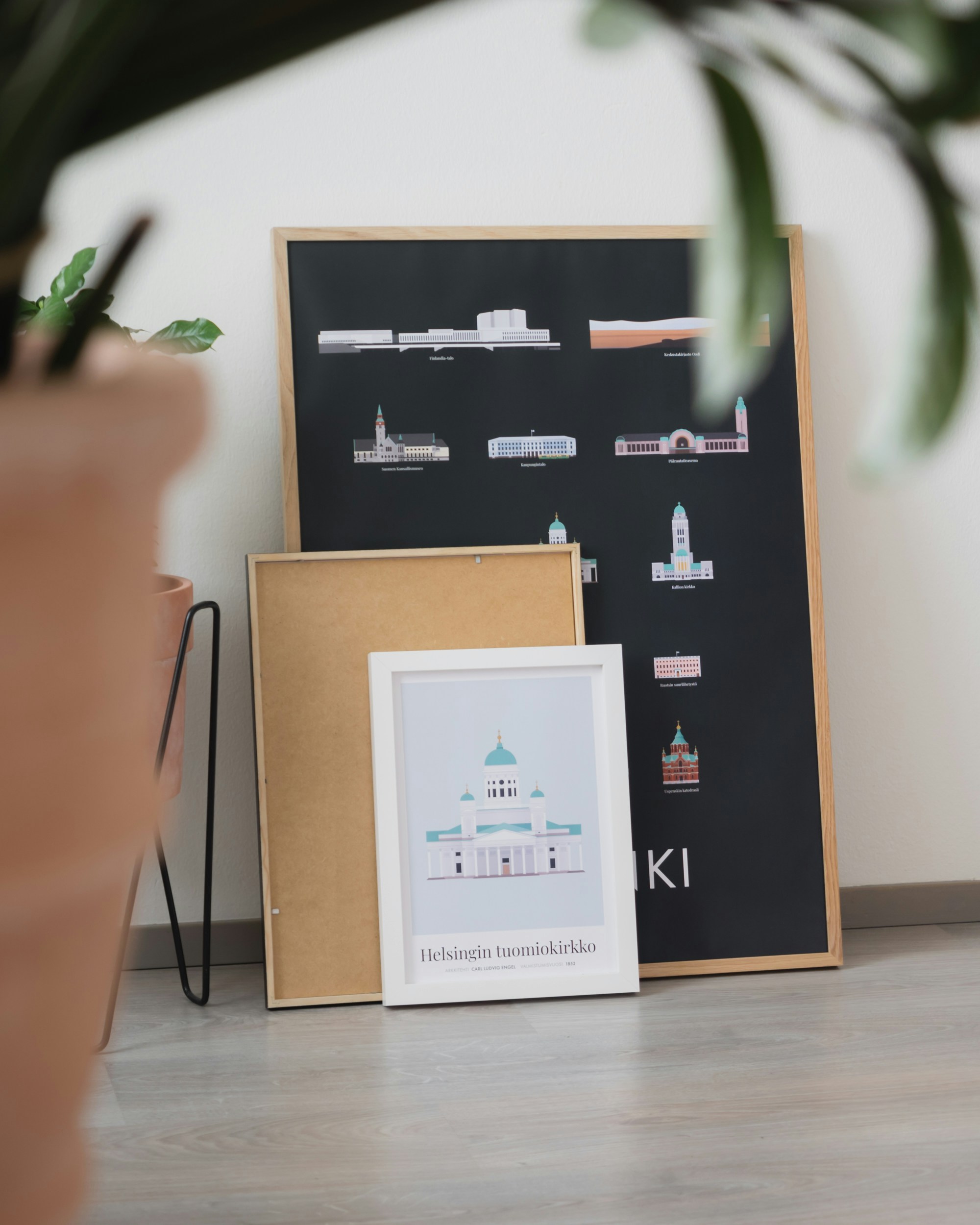 Frames and Chalkboard Cityscapes: A Calm Studio Corner