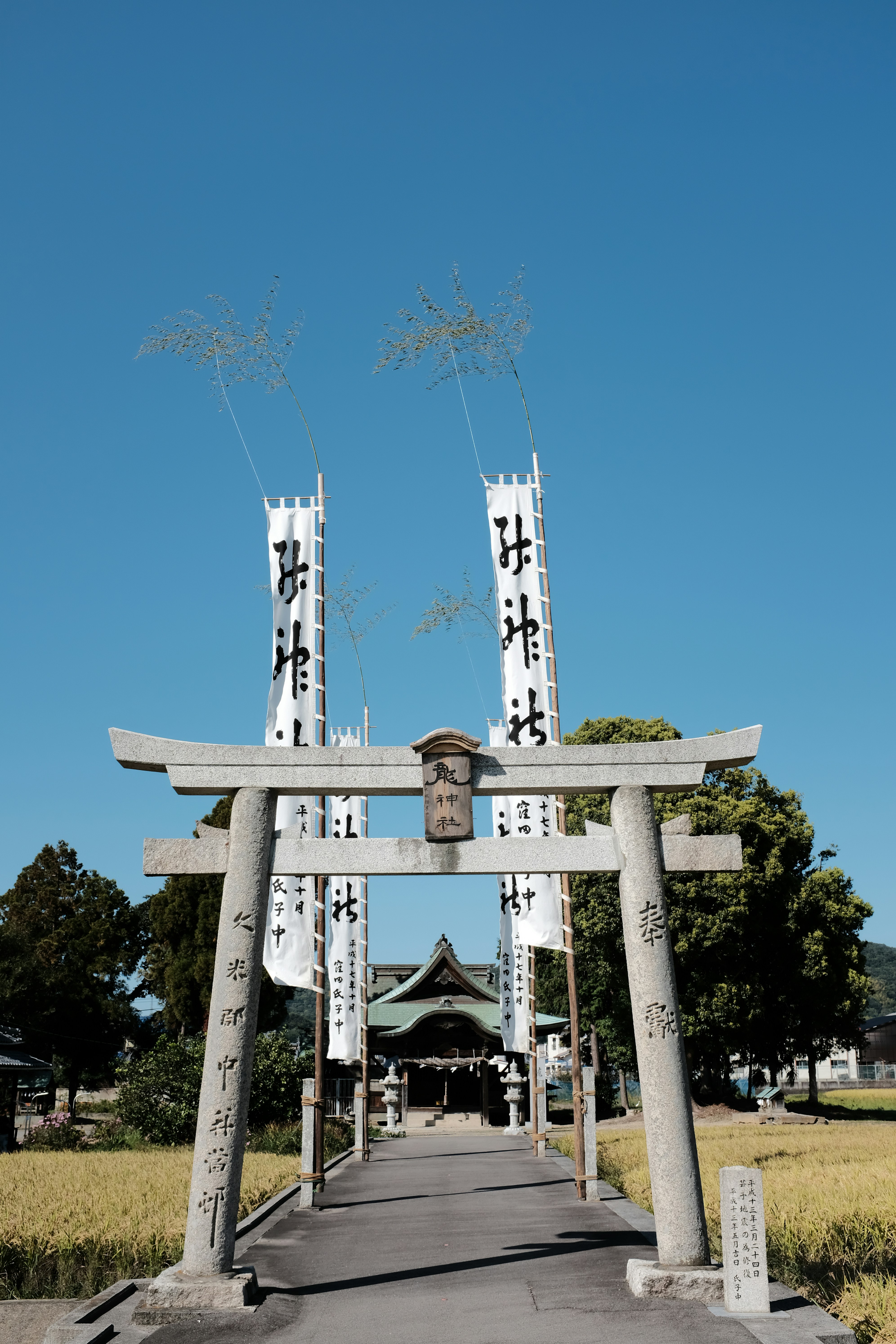 white and brown cross statue