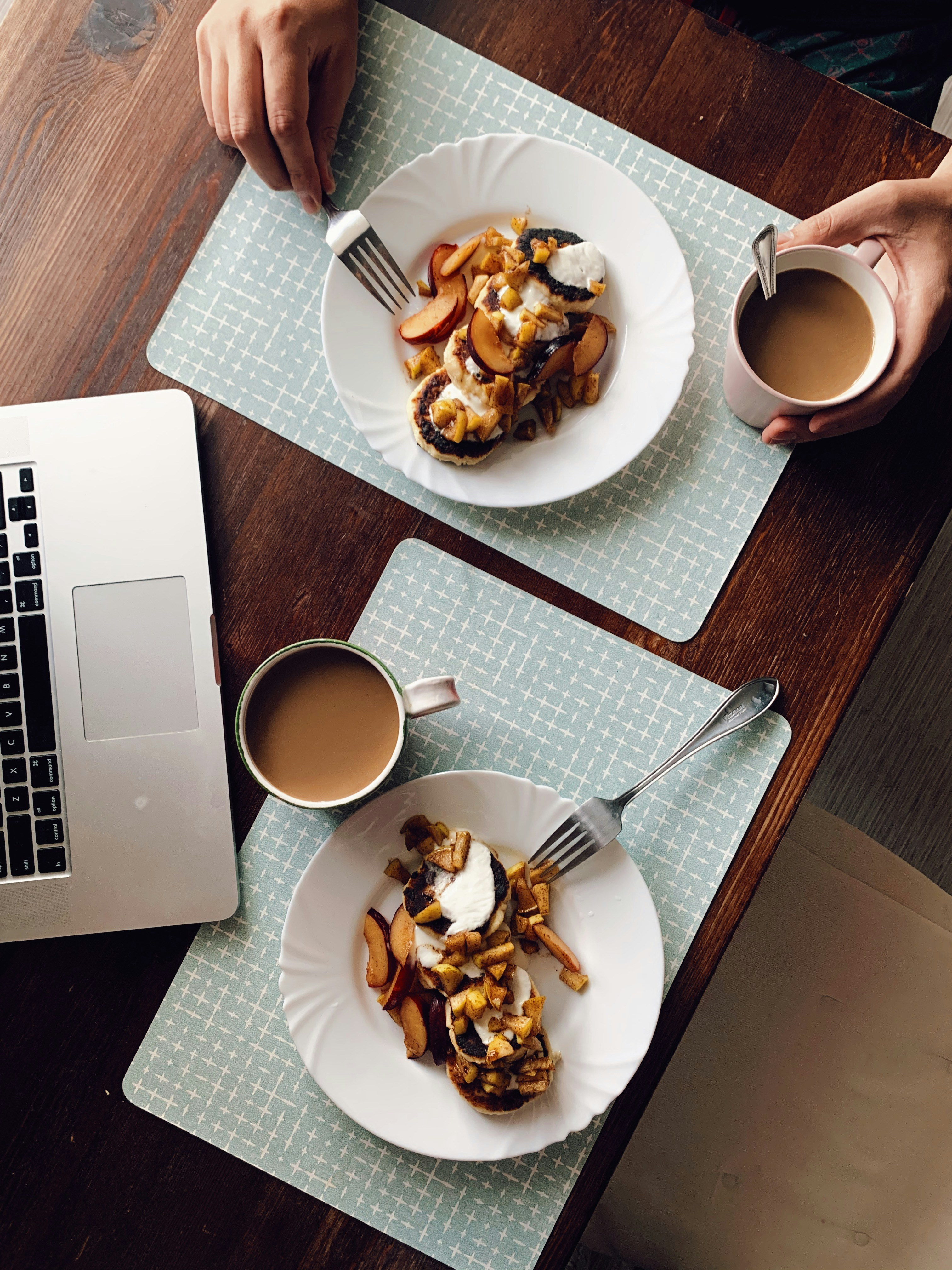 Top-Down Breakfast Duo: Granola Bowls and Coffee on a Wooden Table