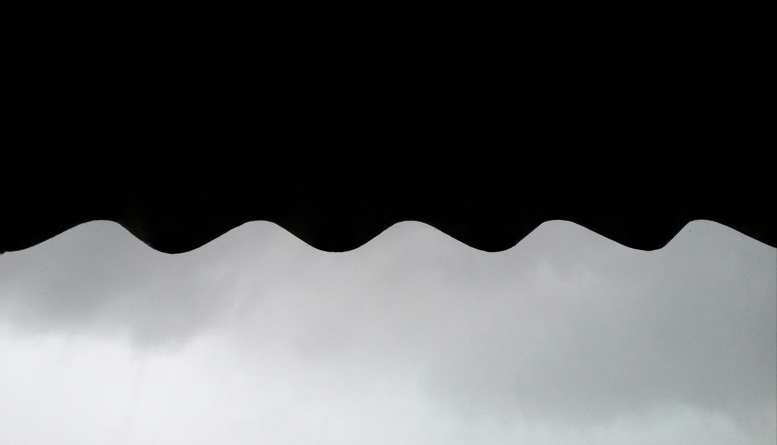 white clouds on black background