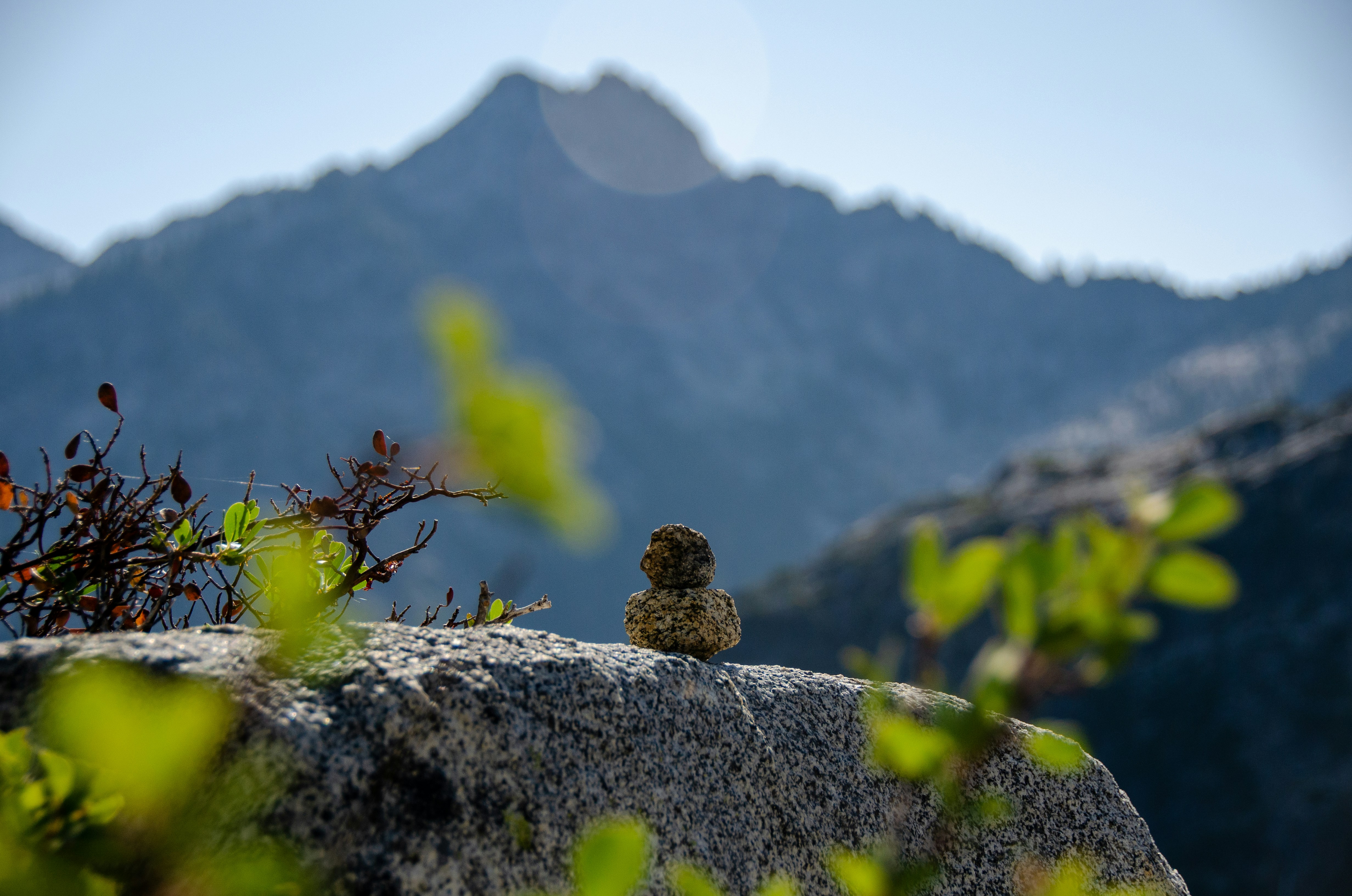 Cairn on Granite: A Quiet Moment Framed by Alpine Peaks