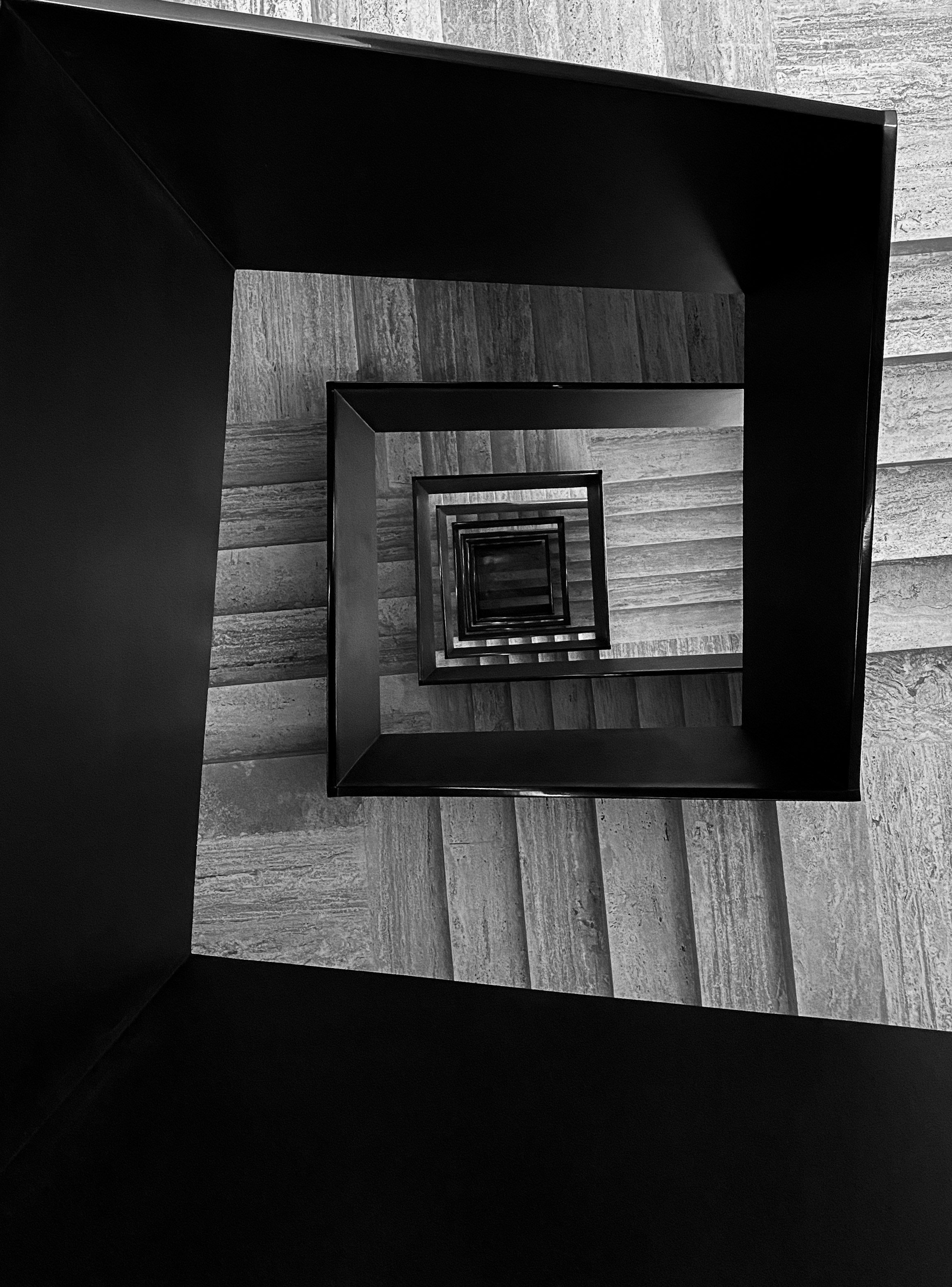 Monochrome Fractals: A Vanishing Staircase of Intersecting Squares