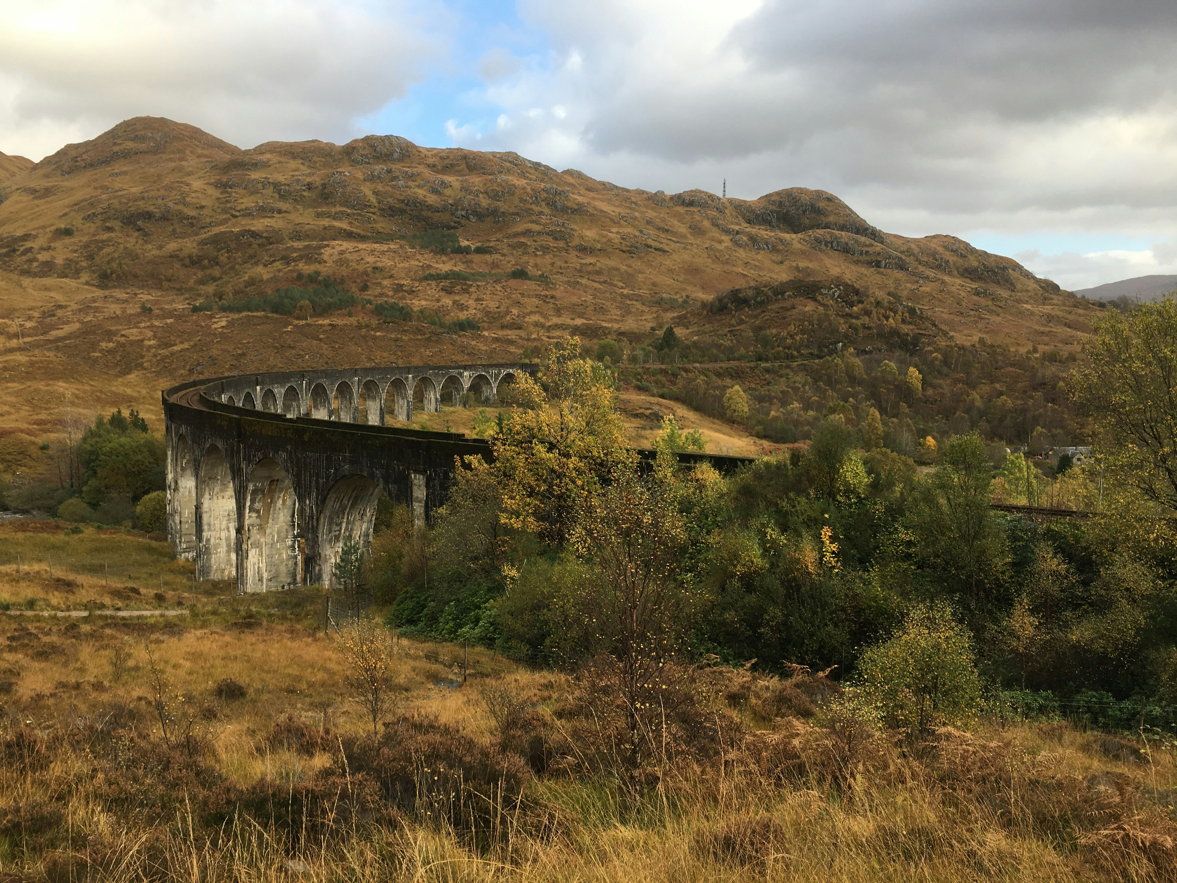 Stone Arches Across a Moor: A Quiet Viaduct Over Flat Grass