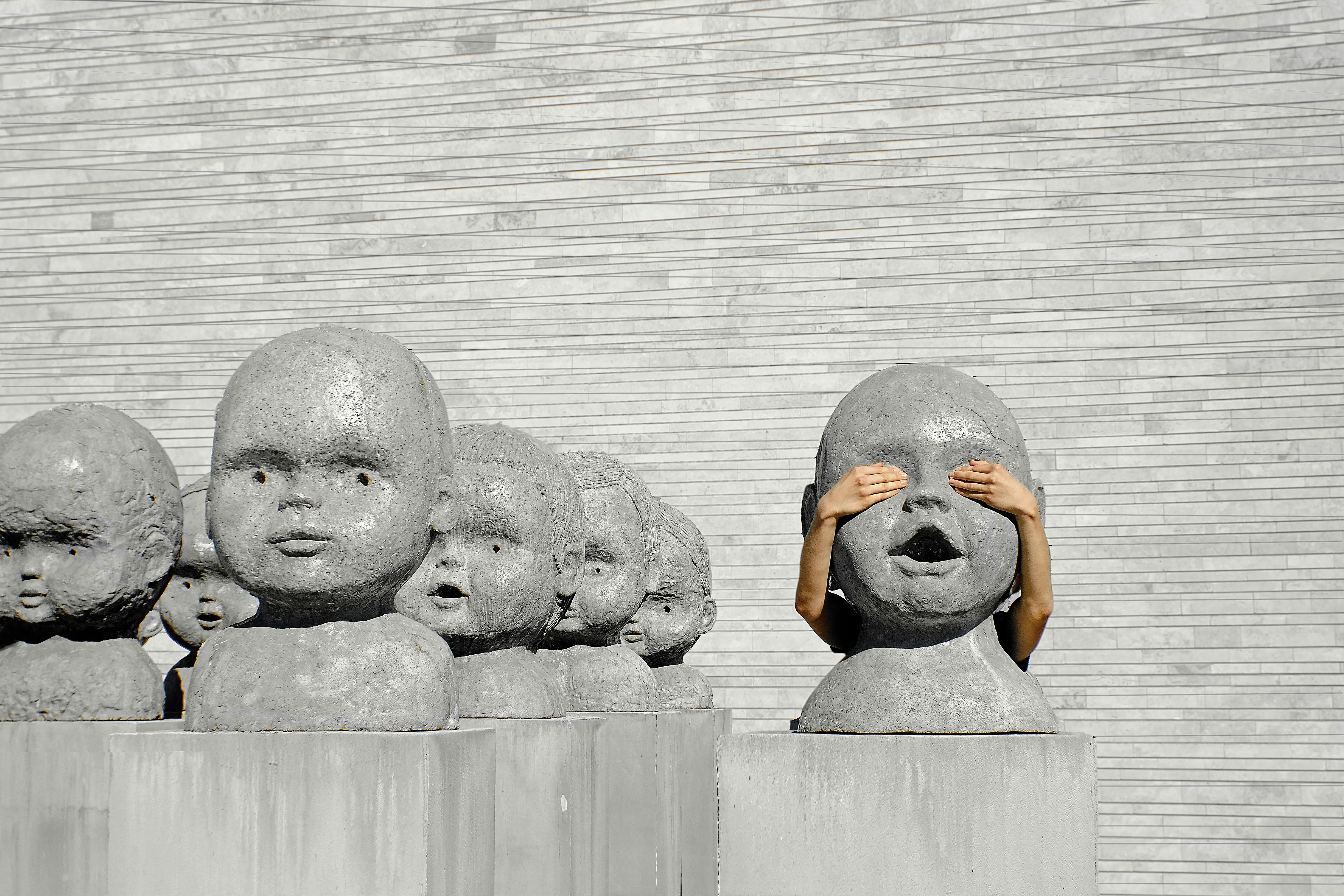 See-No-Evil in Stone: A Row of Concrete Heads