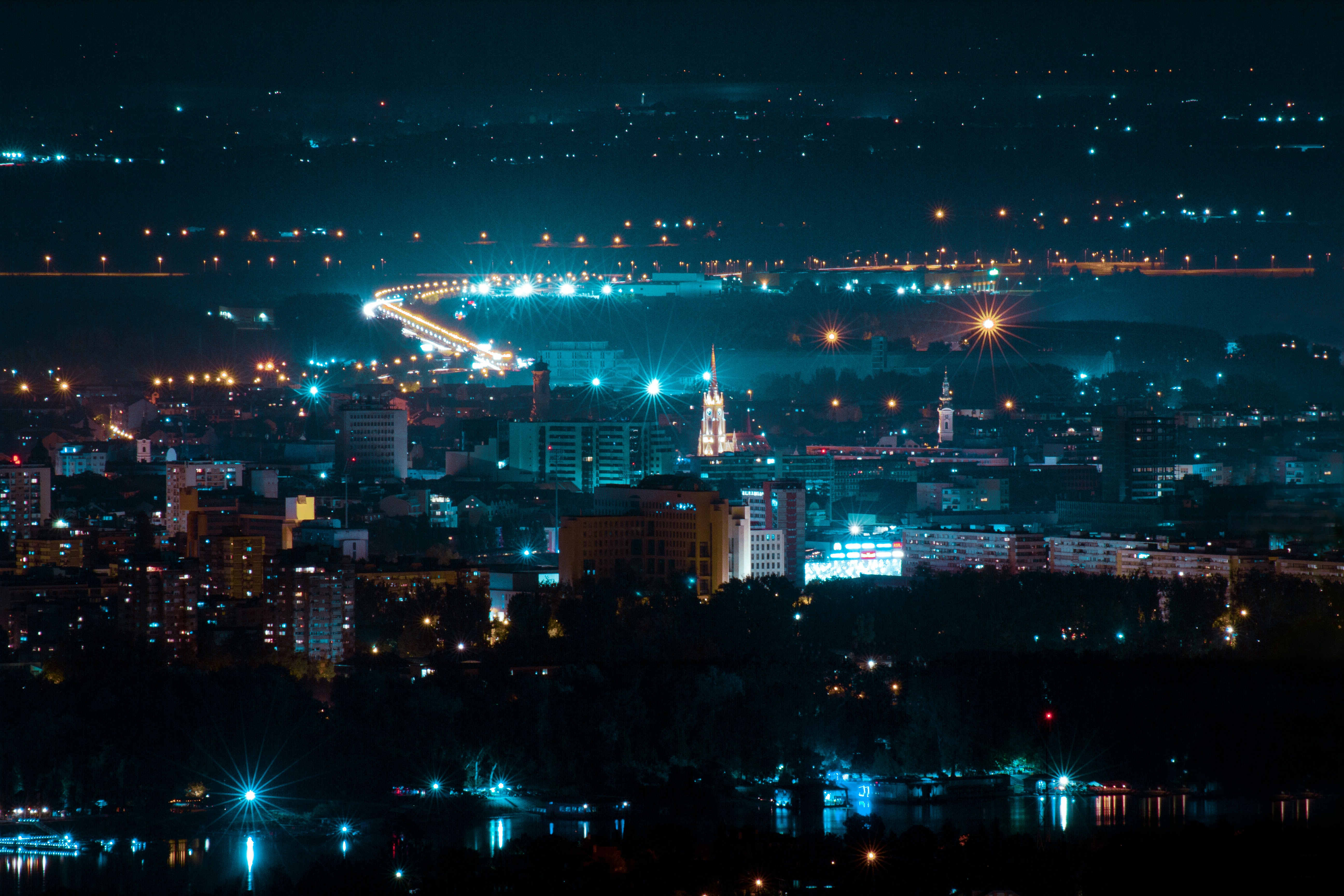 City with high rise buildings during night time photo – Free City Image ...