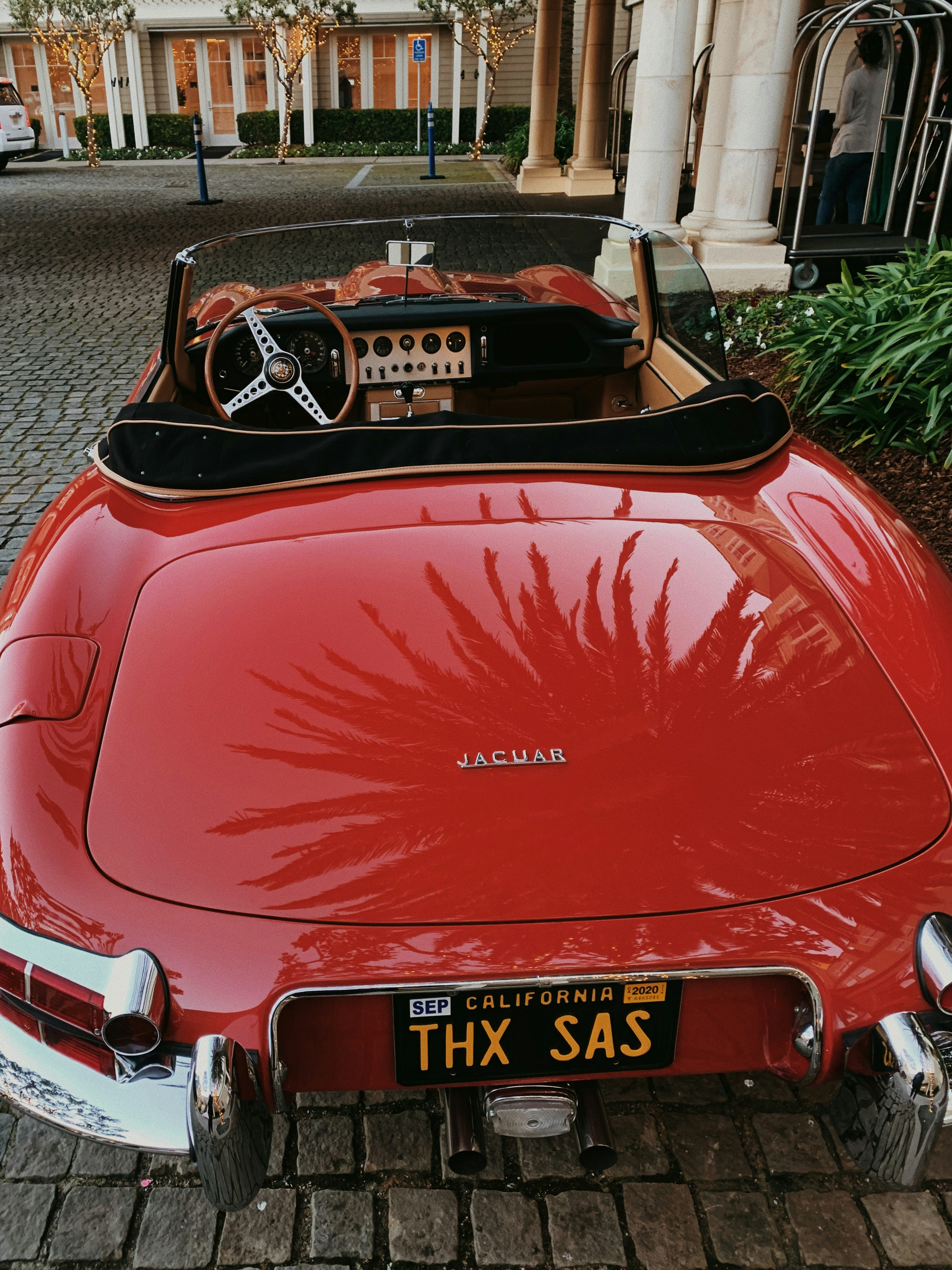 red porsche 911 parked on road during daytime