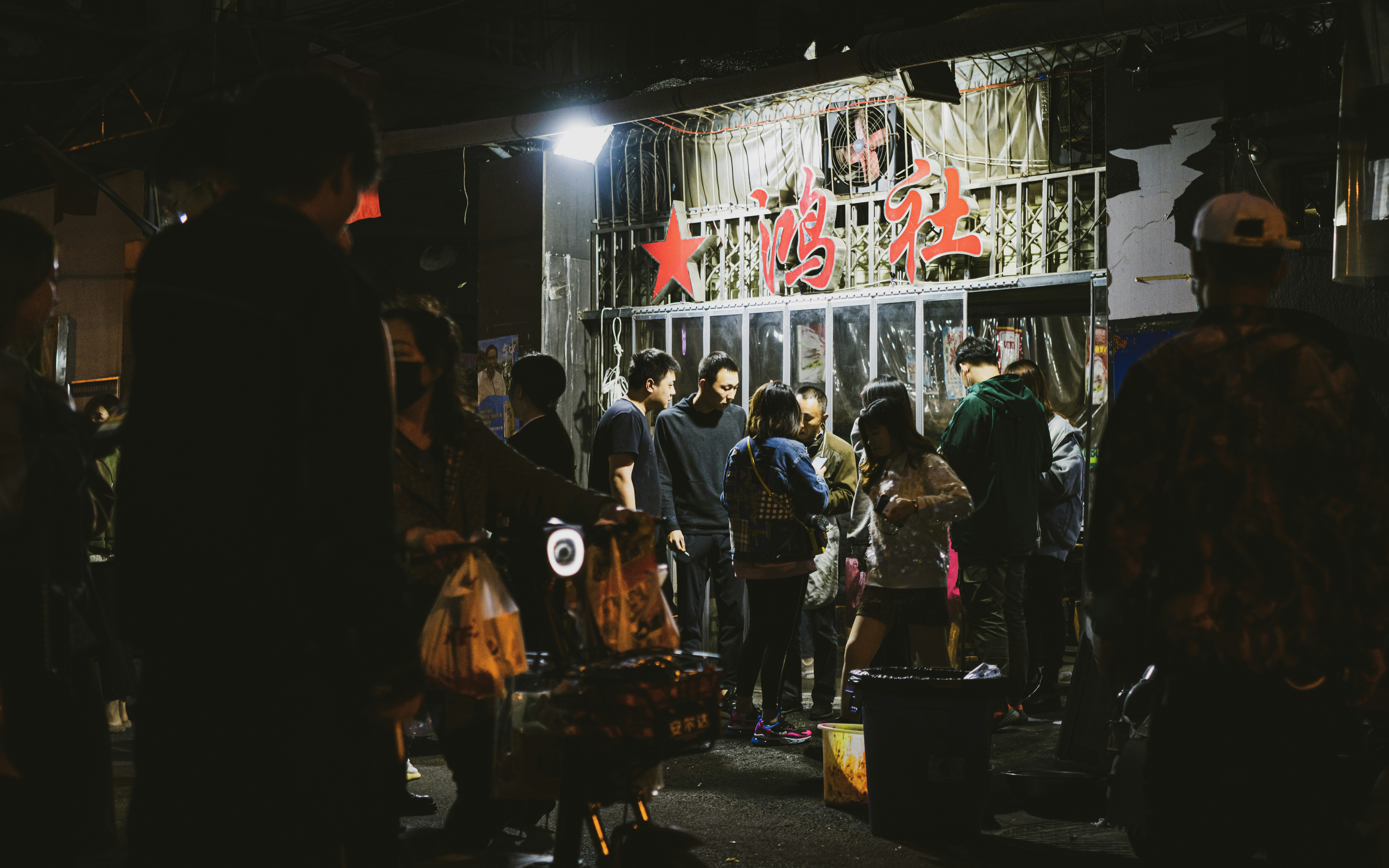 People standing in front of store during nighttime photo – Free Human ...