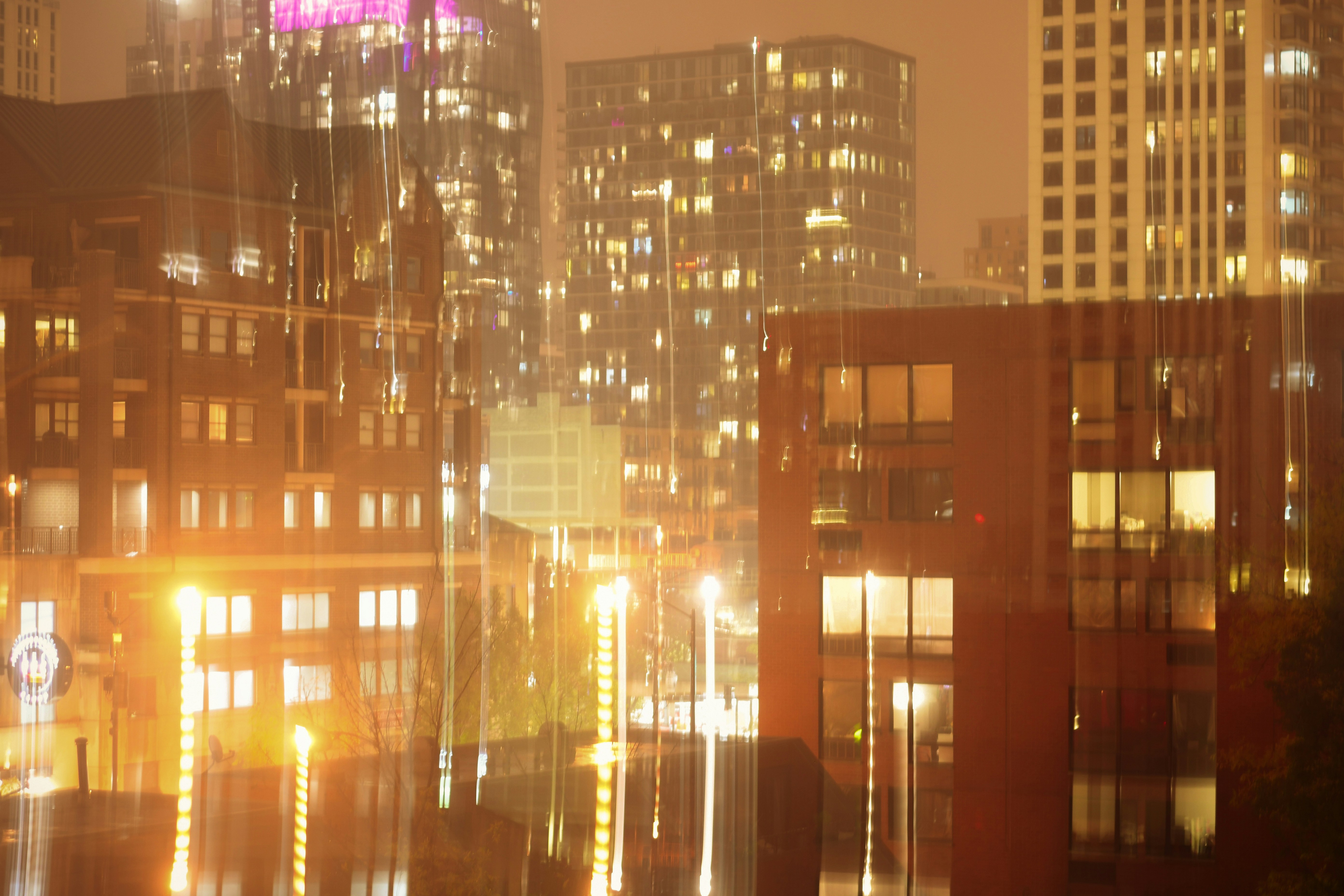 High rise buildings during night time photo – Free Building Image on ...