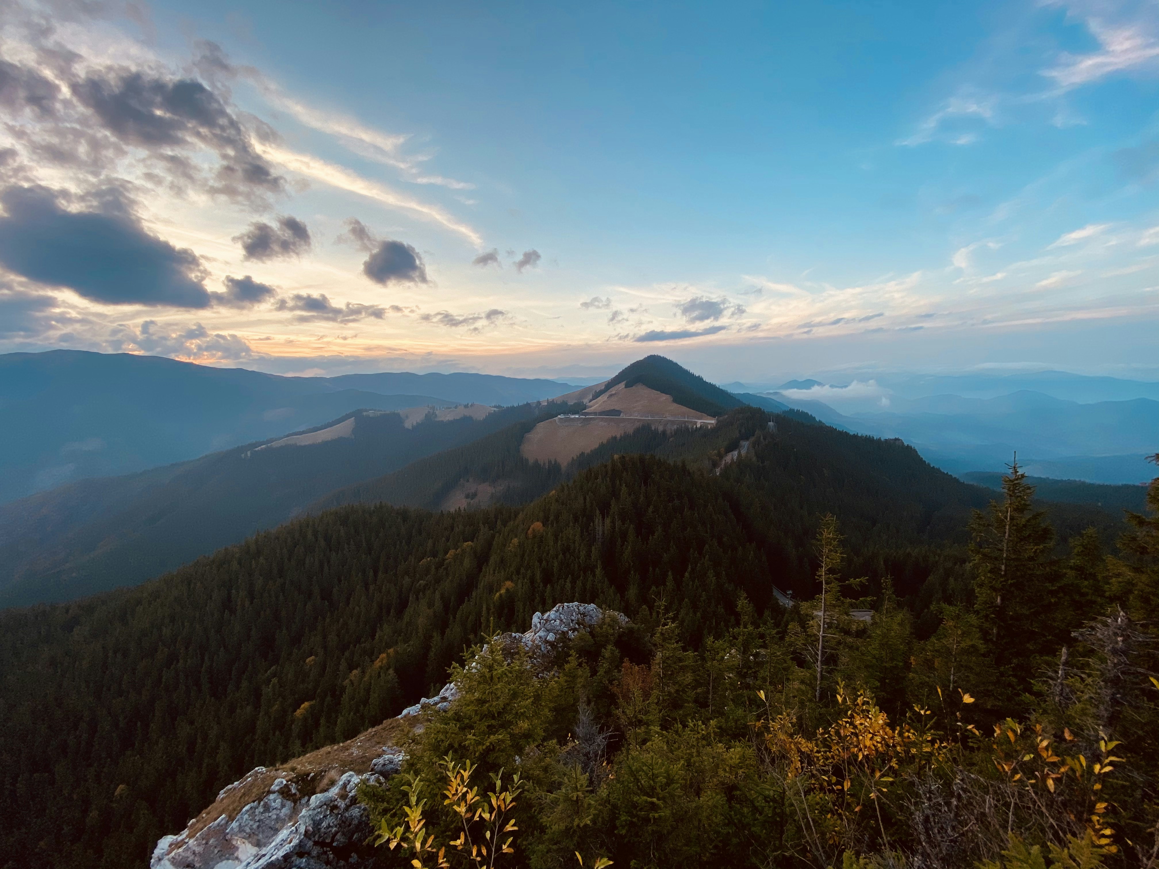 green and brown mountains under blue sky during daytime