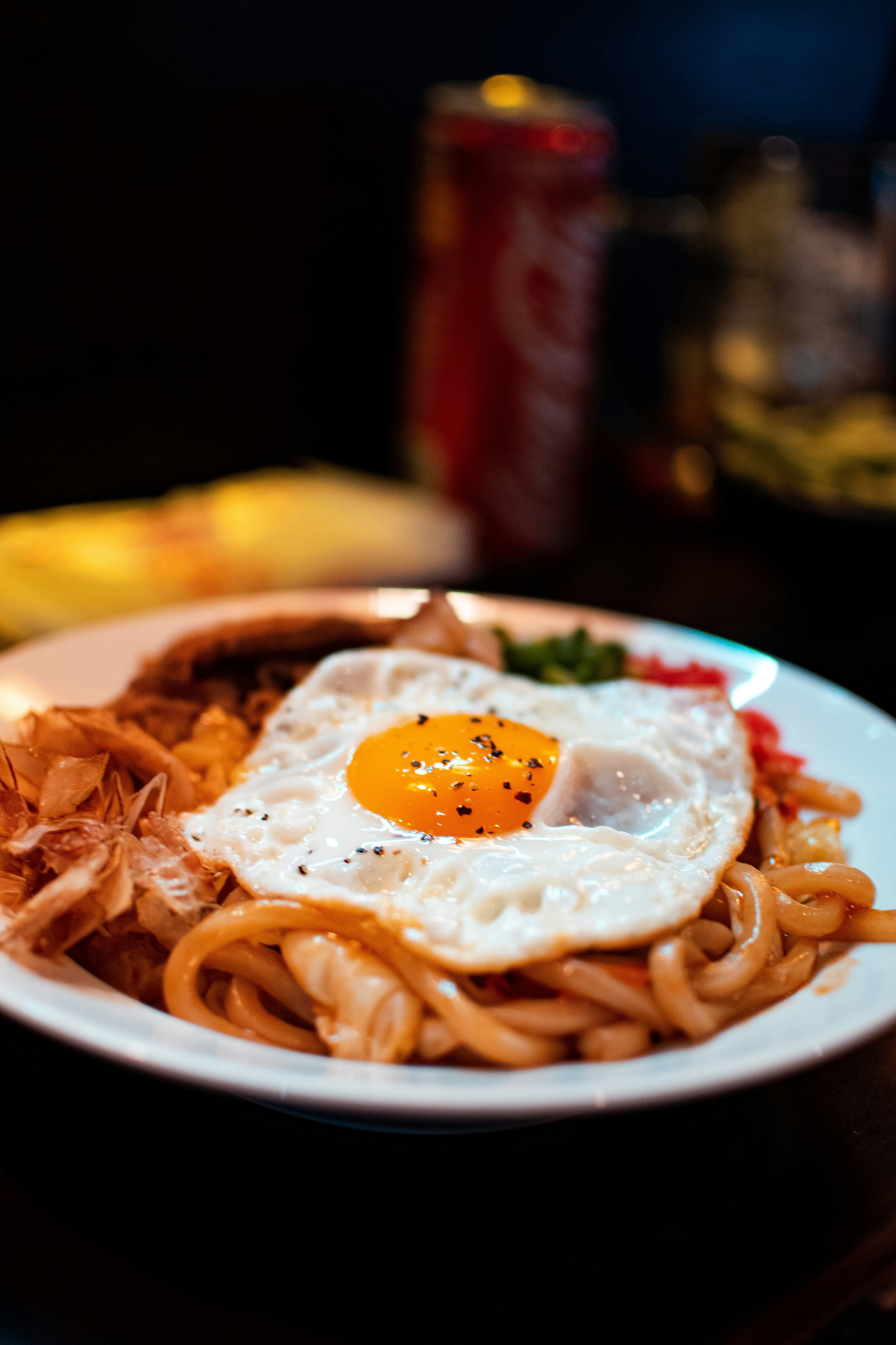 Sunny-Side Crown Over Noodles: A Cozy Plate in Warm Glow