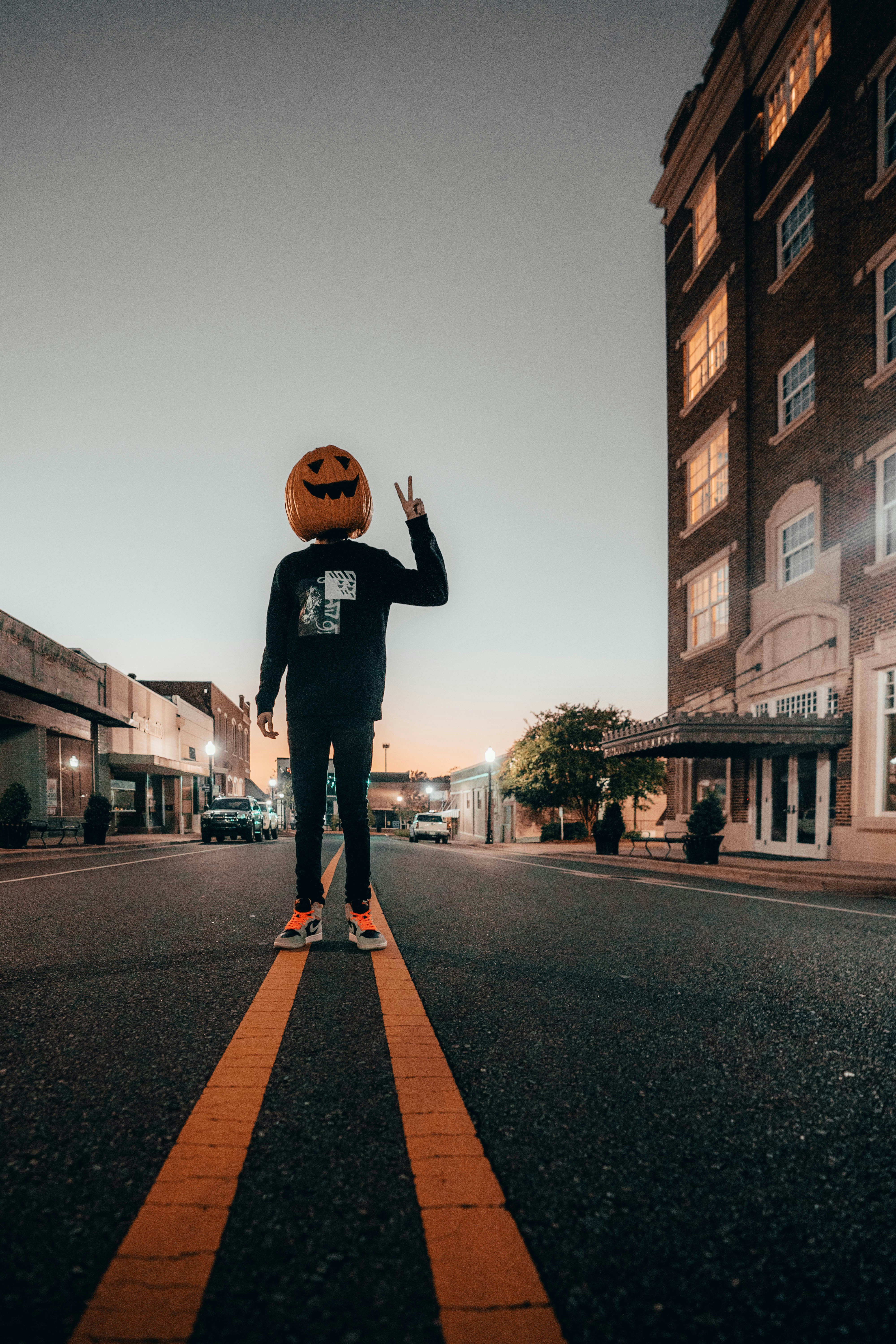 Jack-o'-Head in the Lane: A Halloween Silhouette at Dusk