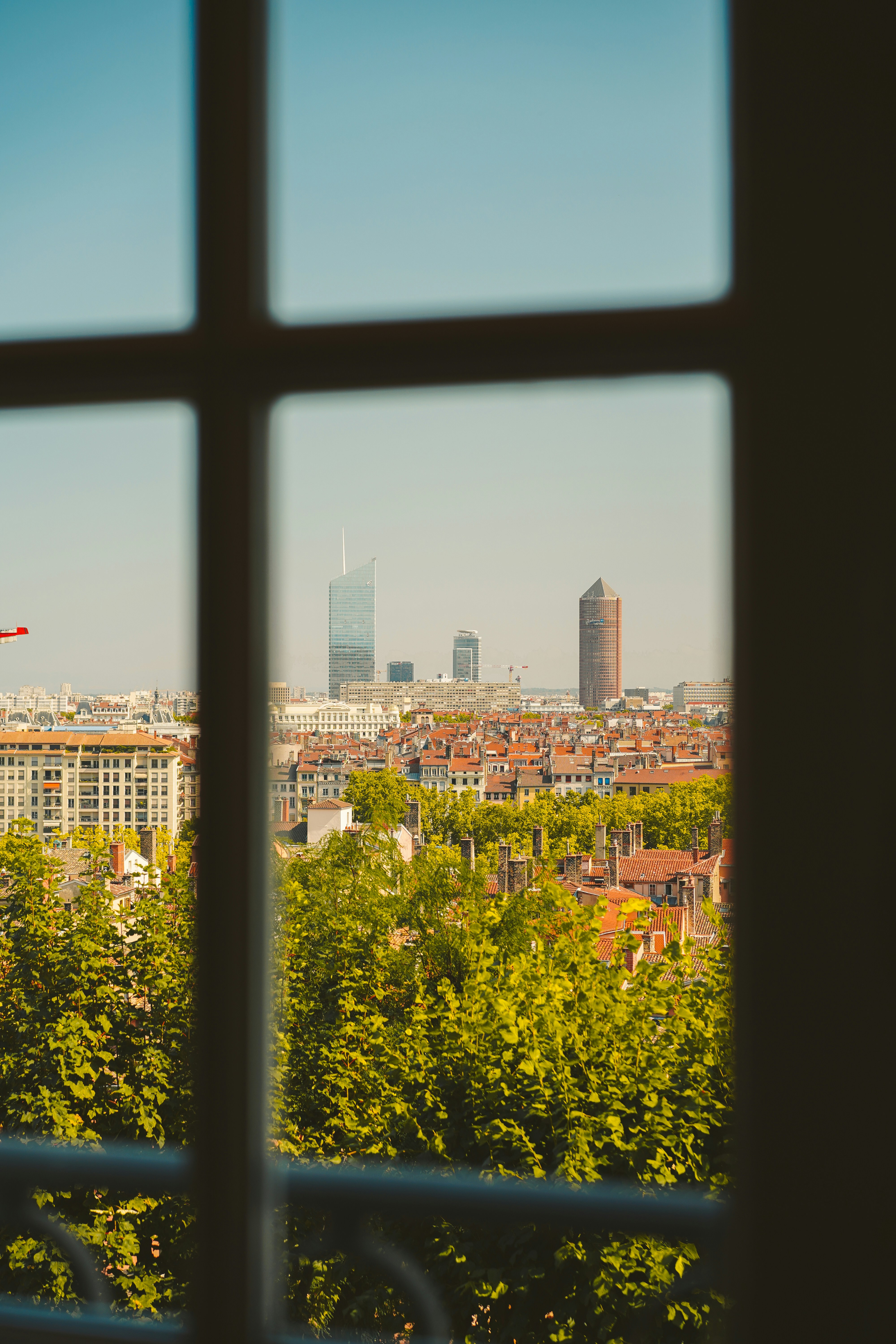 View of city buildings from window photo – Free France Image on Unsplash
