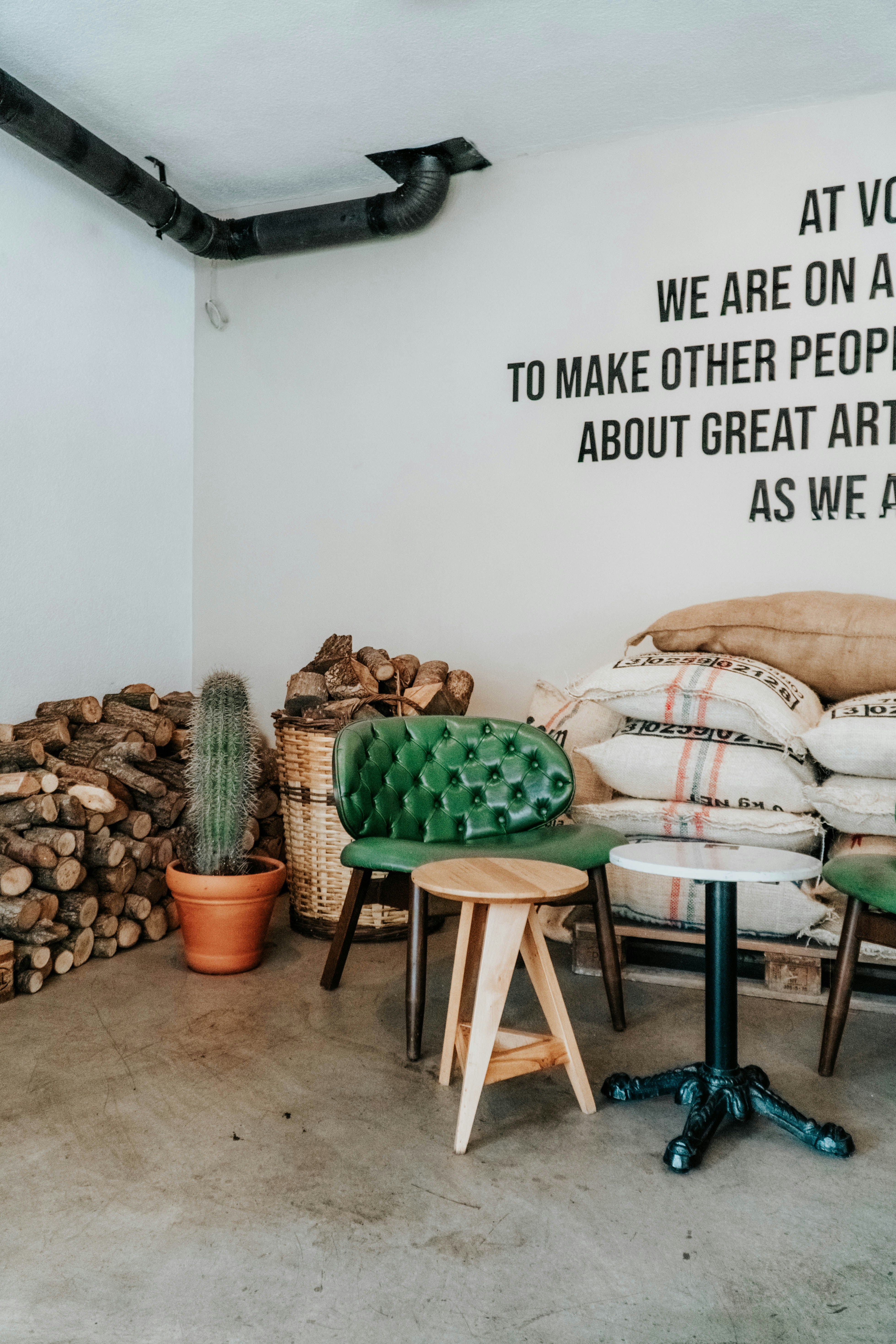 Studio Corner with Potted Cactus and Stacked Burlap Bags
