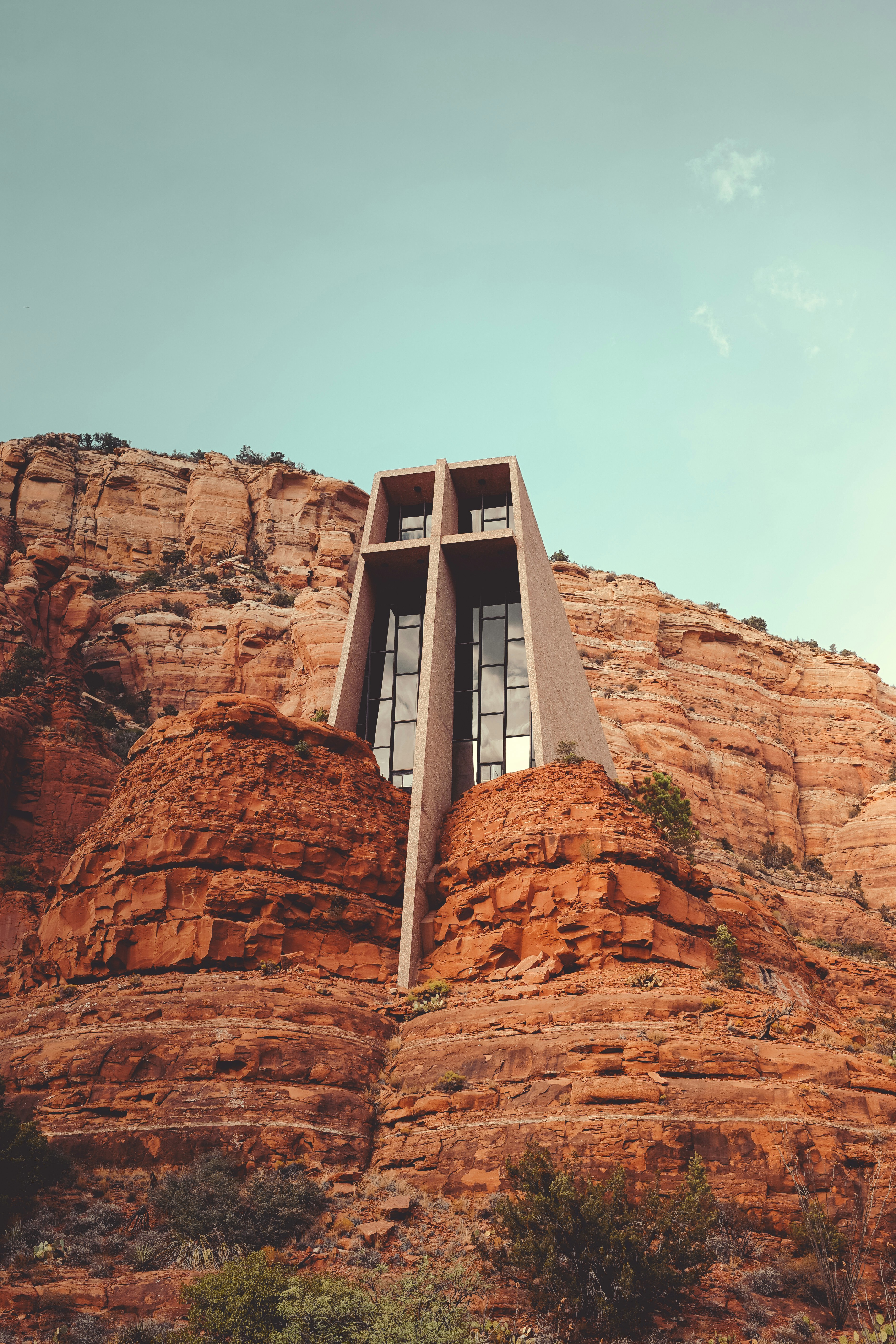 Concrete Prism Rising from the Red Canyon Cliff