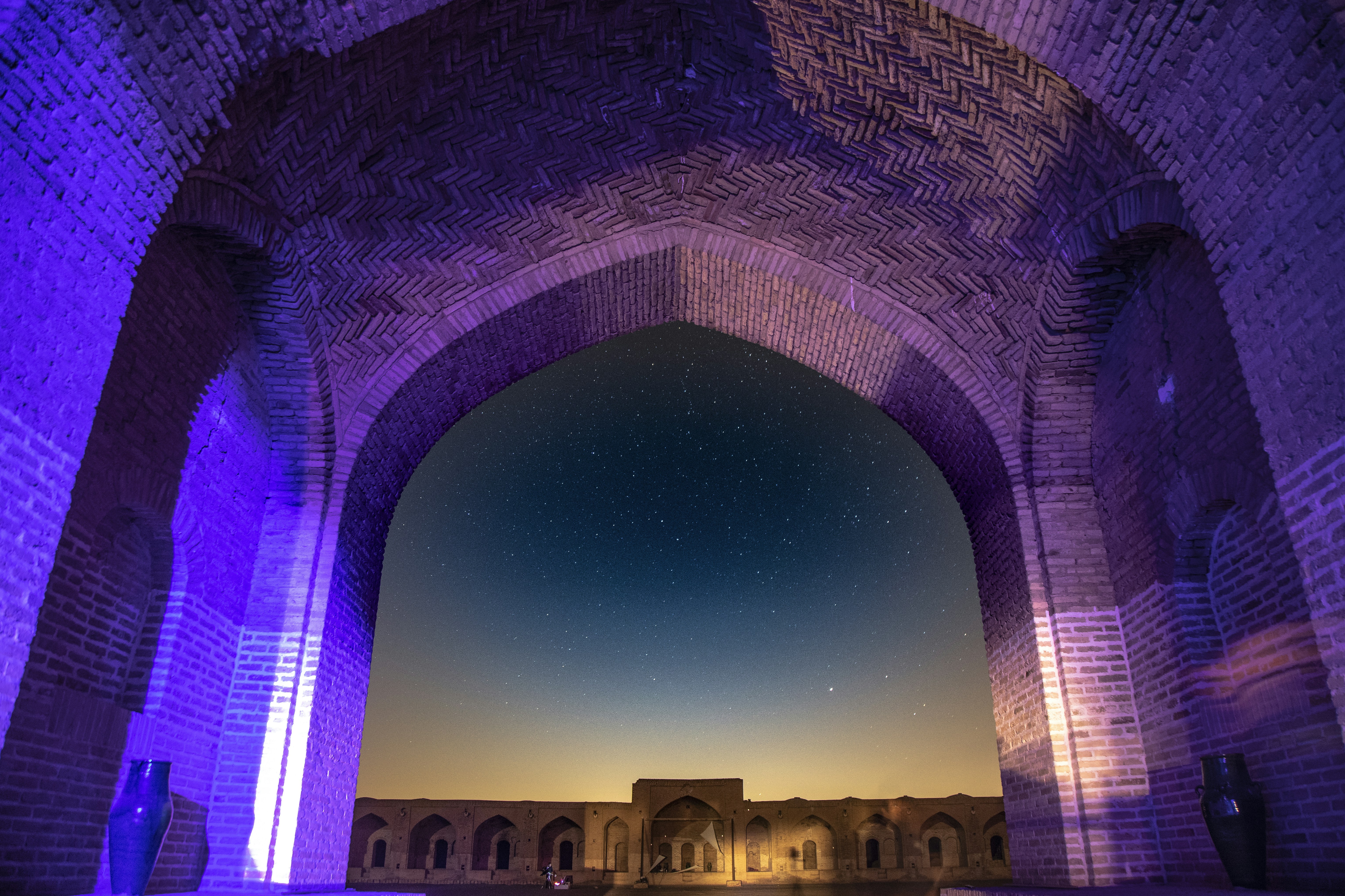 Desert Archway Under a Starry Canopy