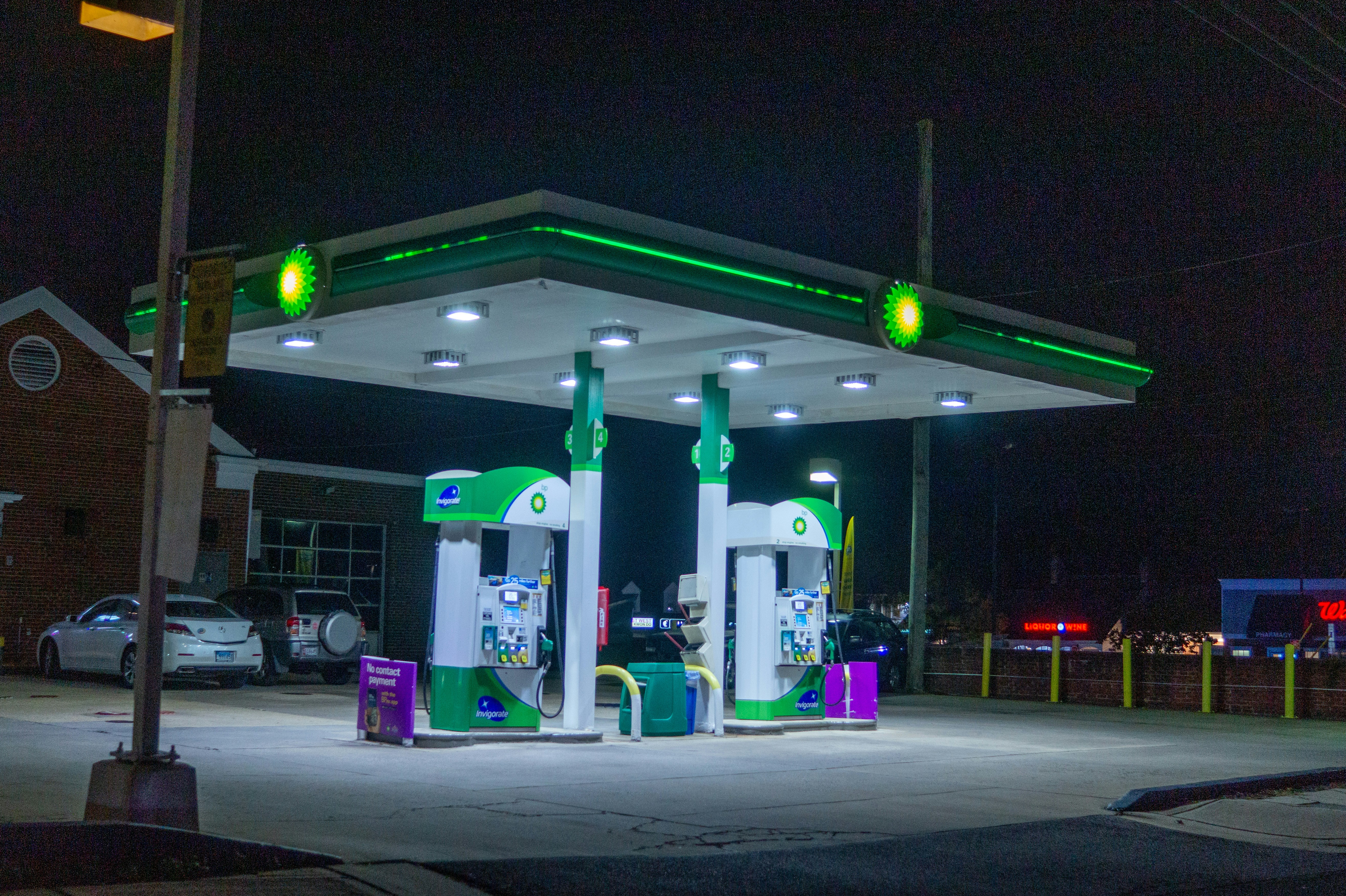 White and green gas station photo – Free Gas station Image on Unsplash
