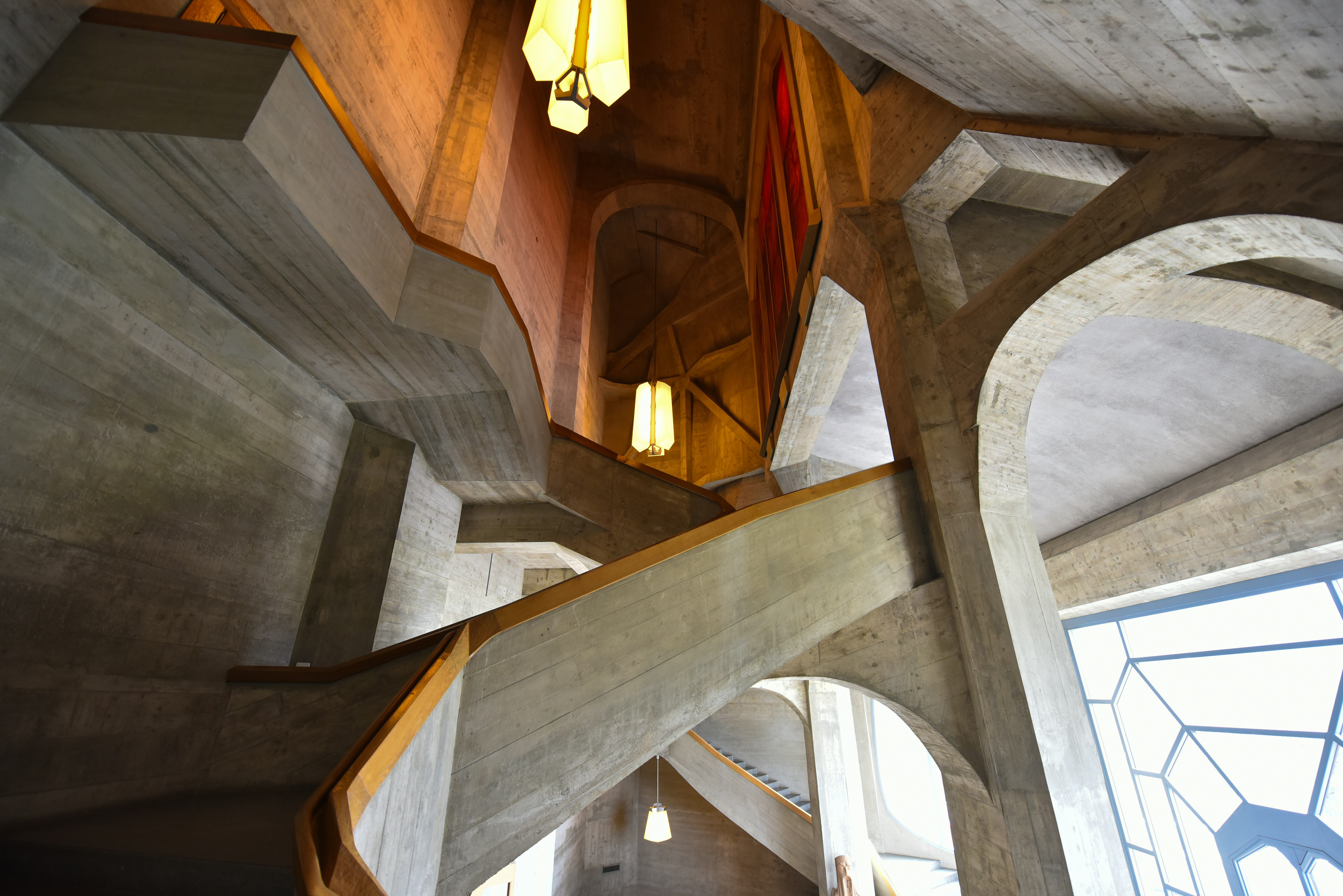 Chiseled Light: Geometry and Warmth in a Concrete Stairwell