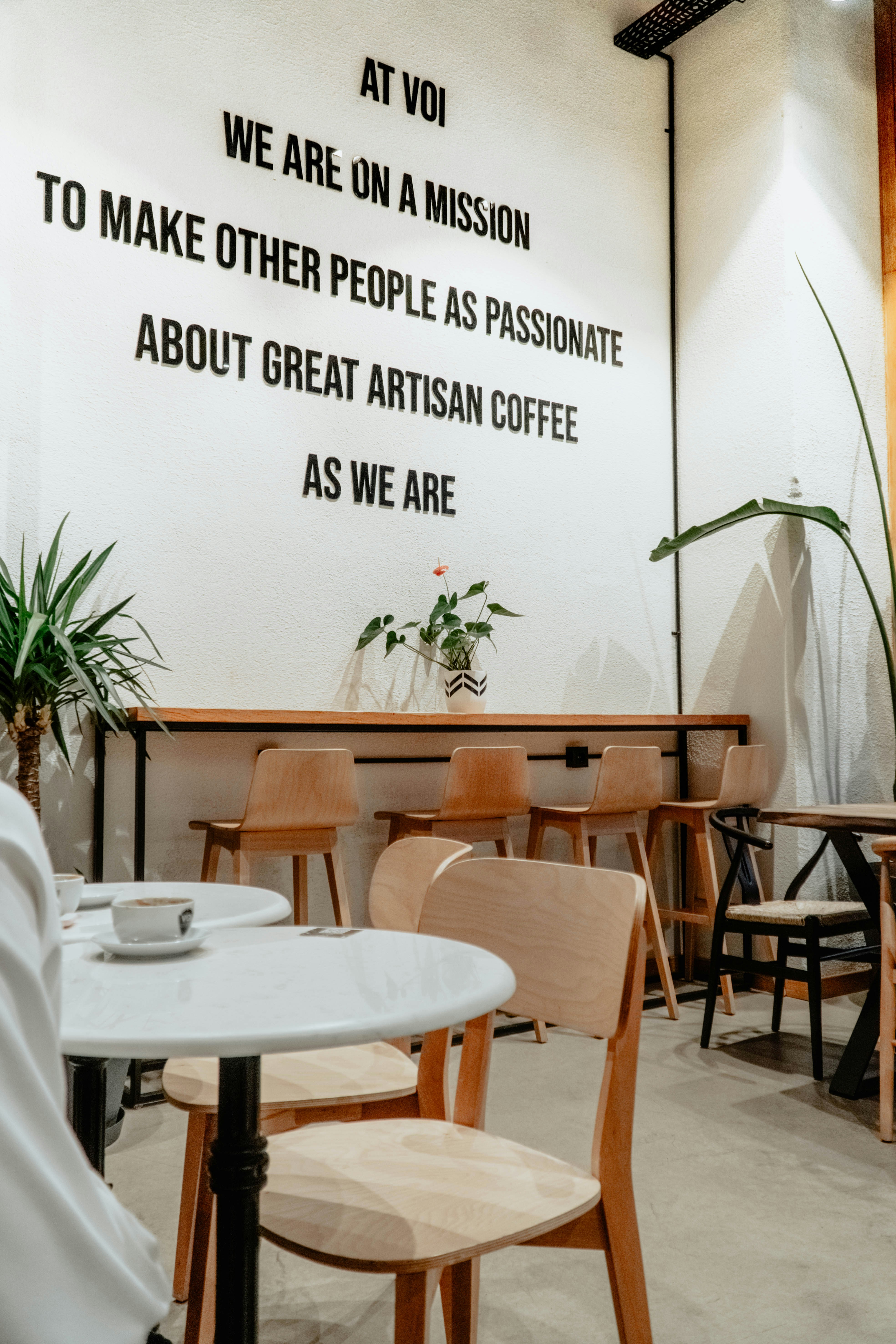 Mission in Soft Light: A Café Scene with Bold Wall Typography
