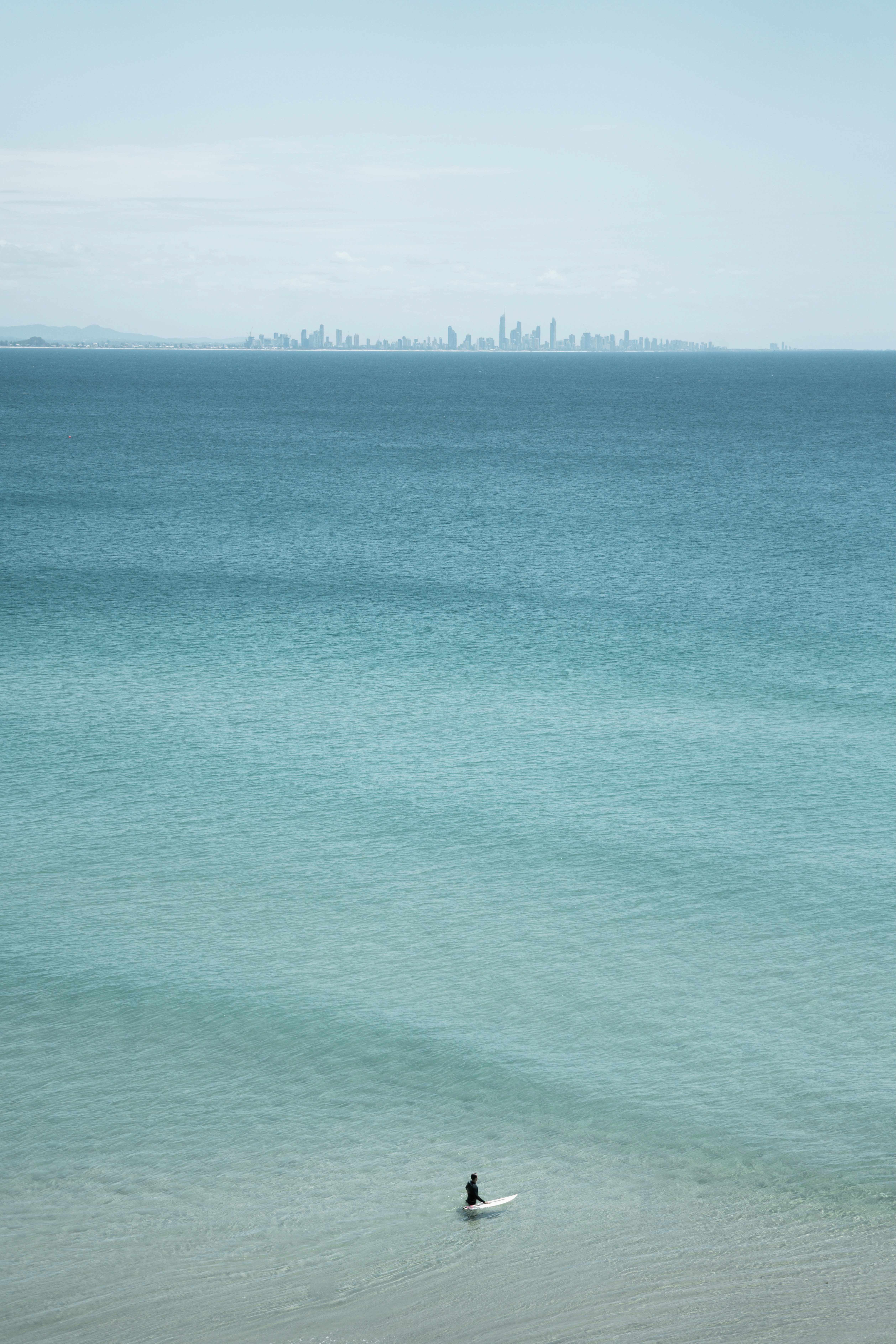 green ocean under blue sky during daytime