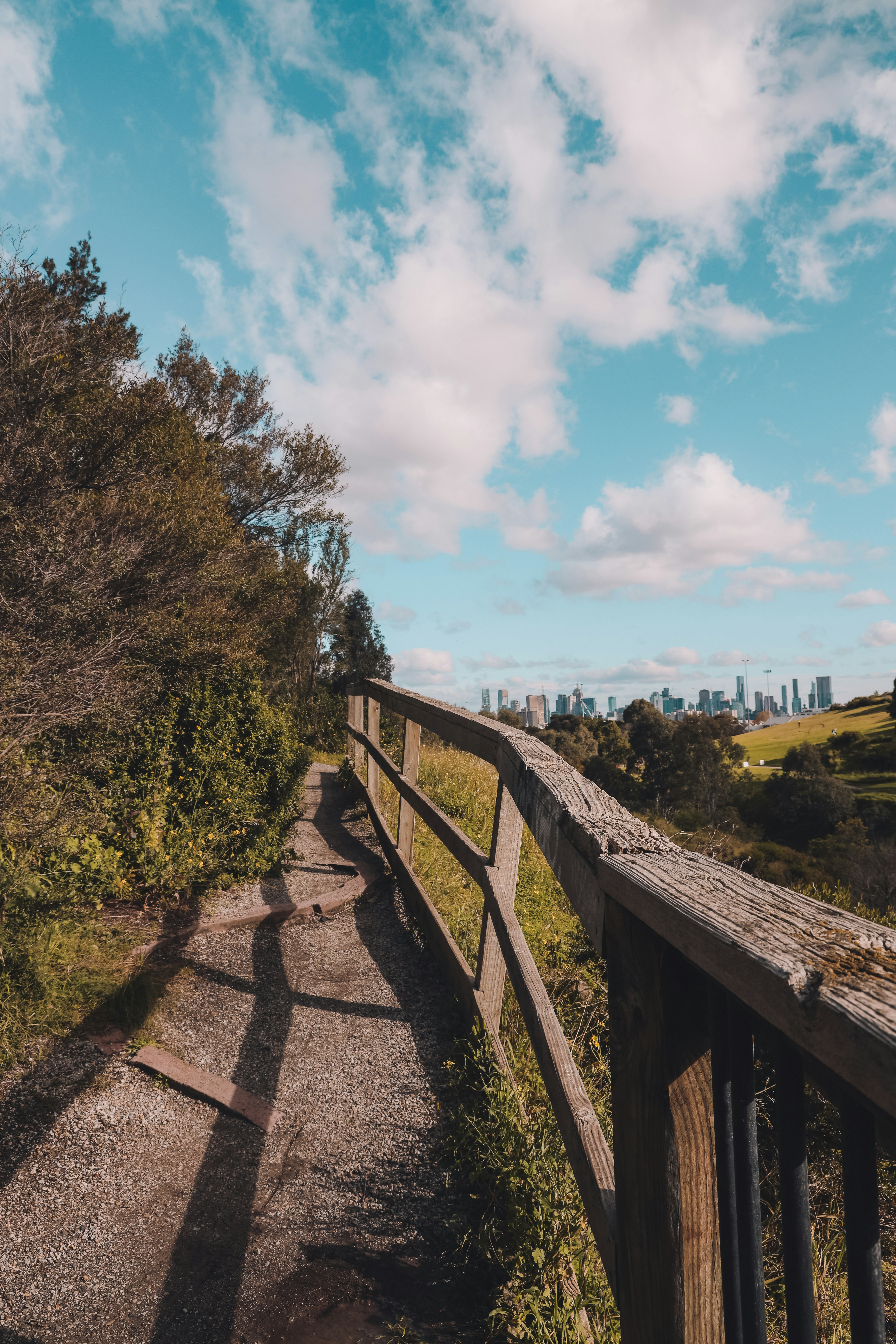 Ridge Walk: Wooden Fence Framing the Distant Skyline