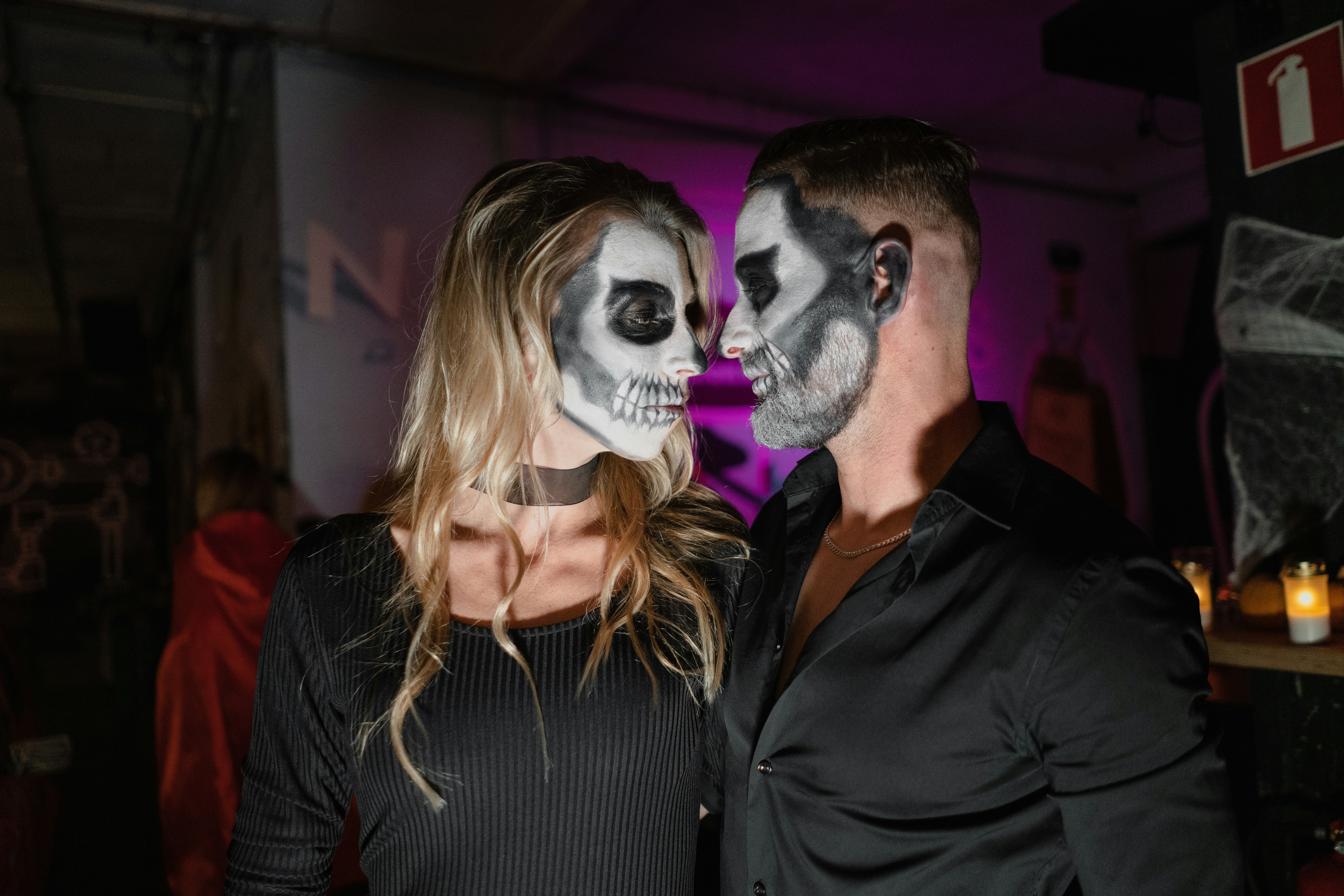 Two Faces, One Night: Faces Painted in Neon Shadows