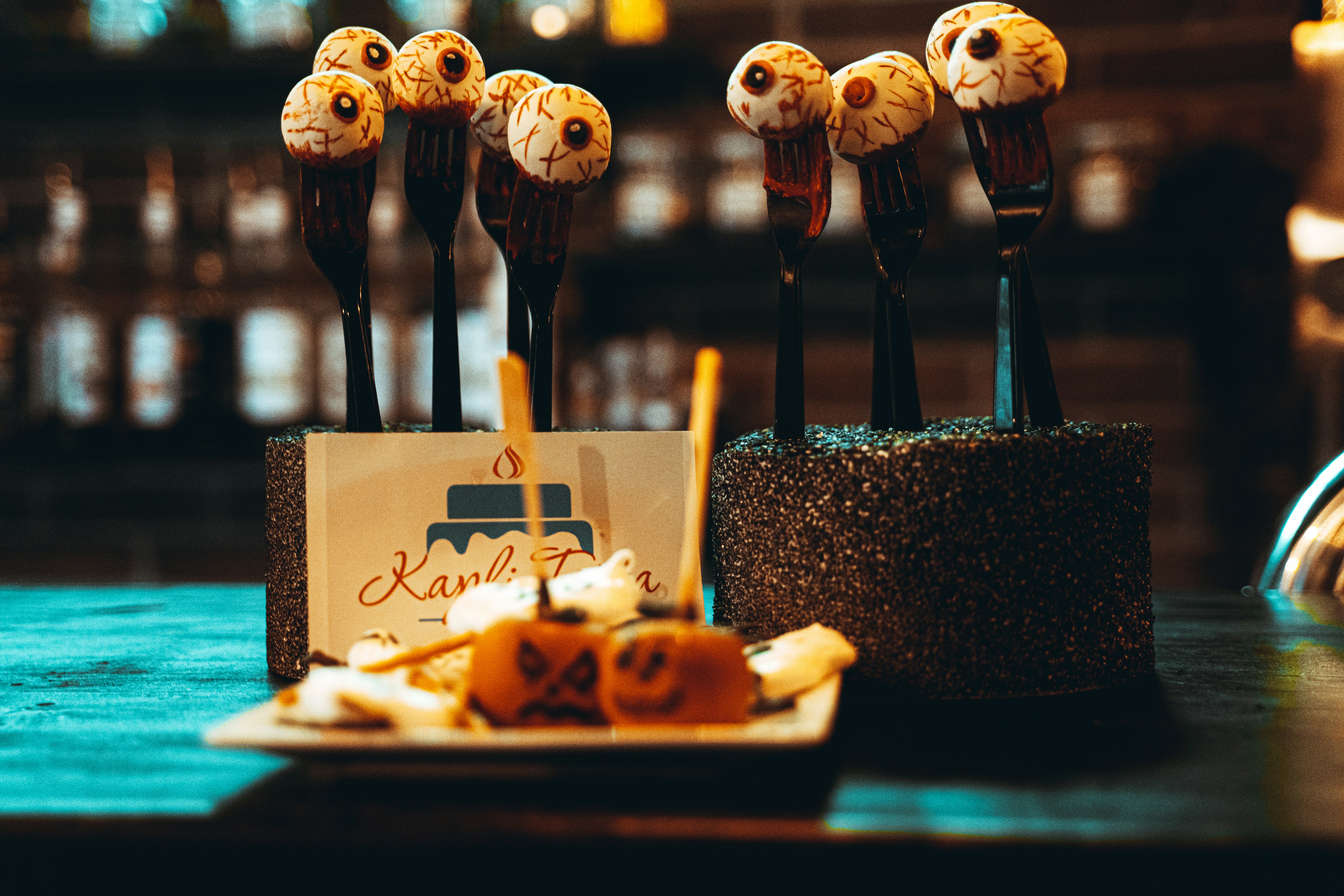 Moonlit Maple Bar: Halloween-Themed Cake Pops by the Counter