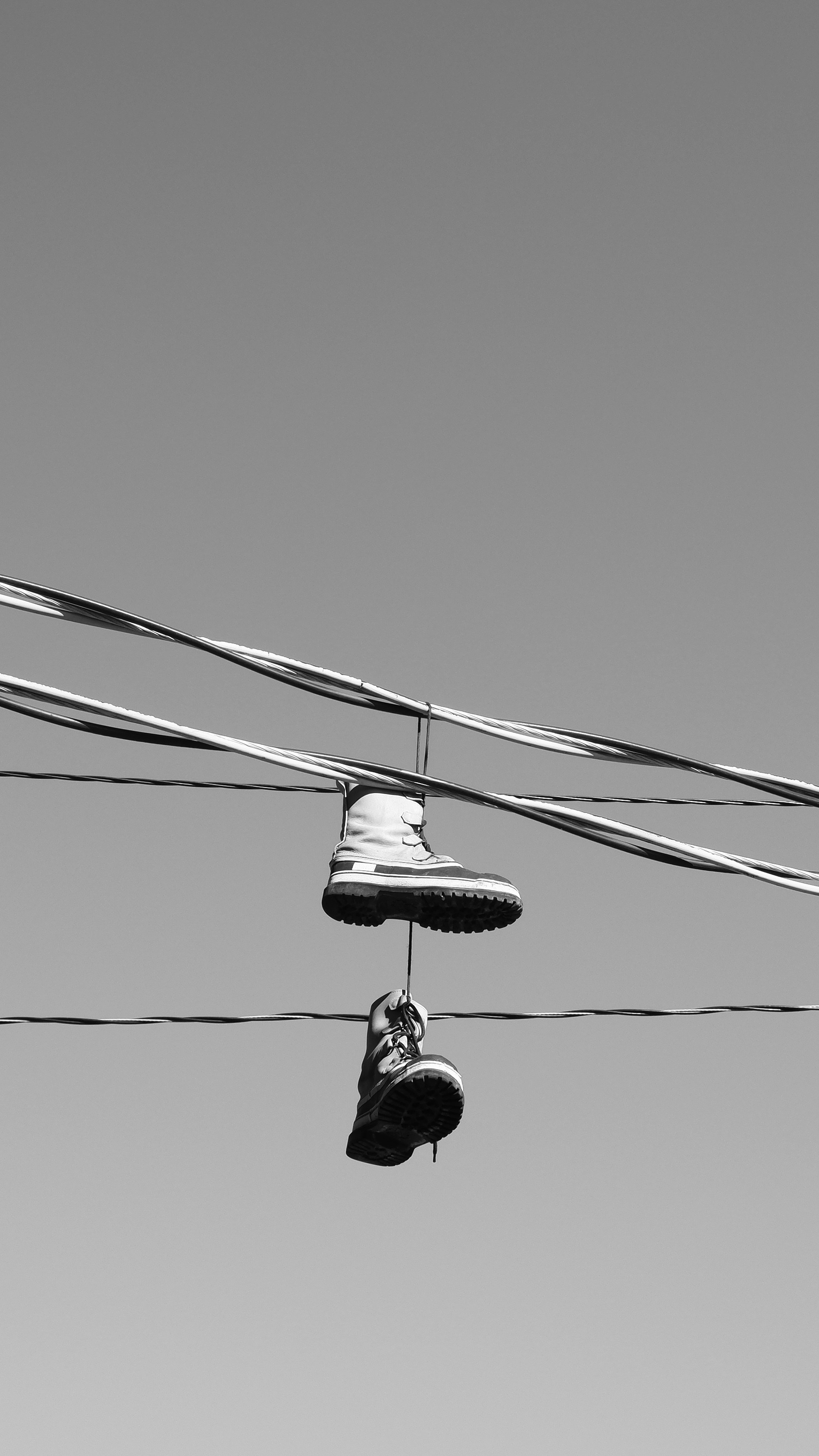 grayscale photo of 2 cable cars