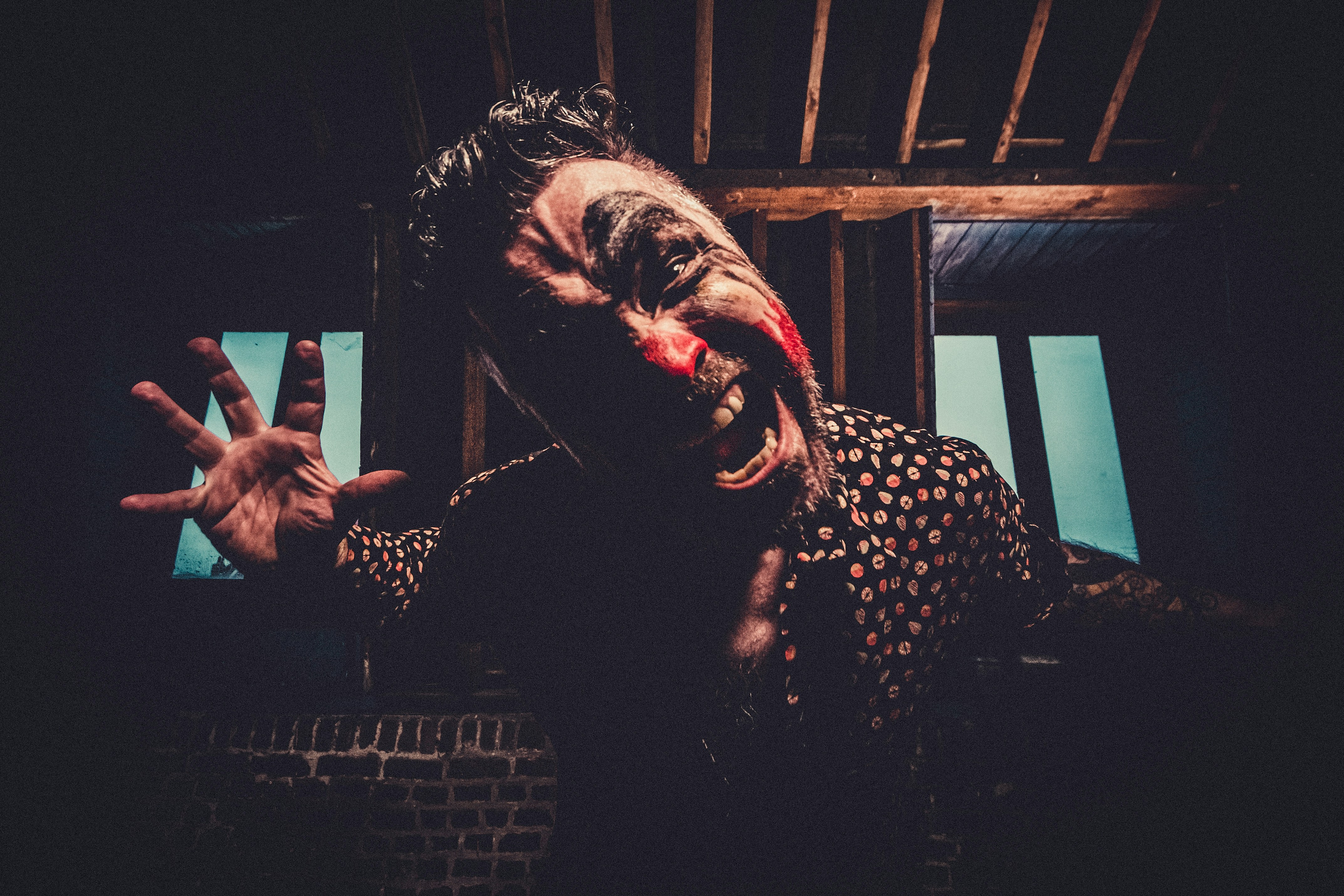 Midnight Grin in the Attic: A Masked Clown Breaks Through the Shadows