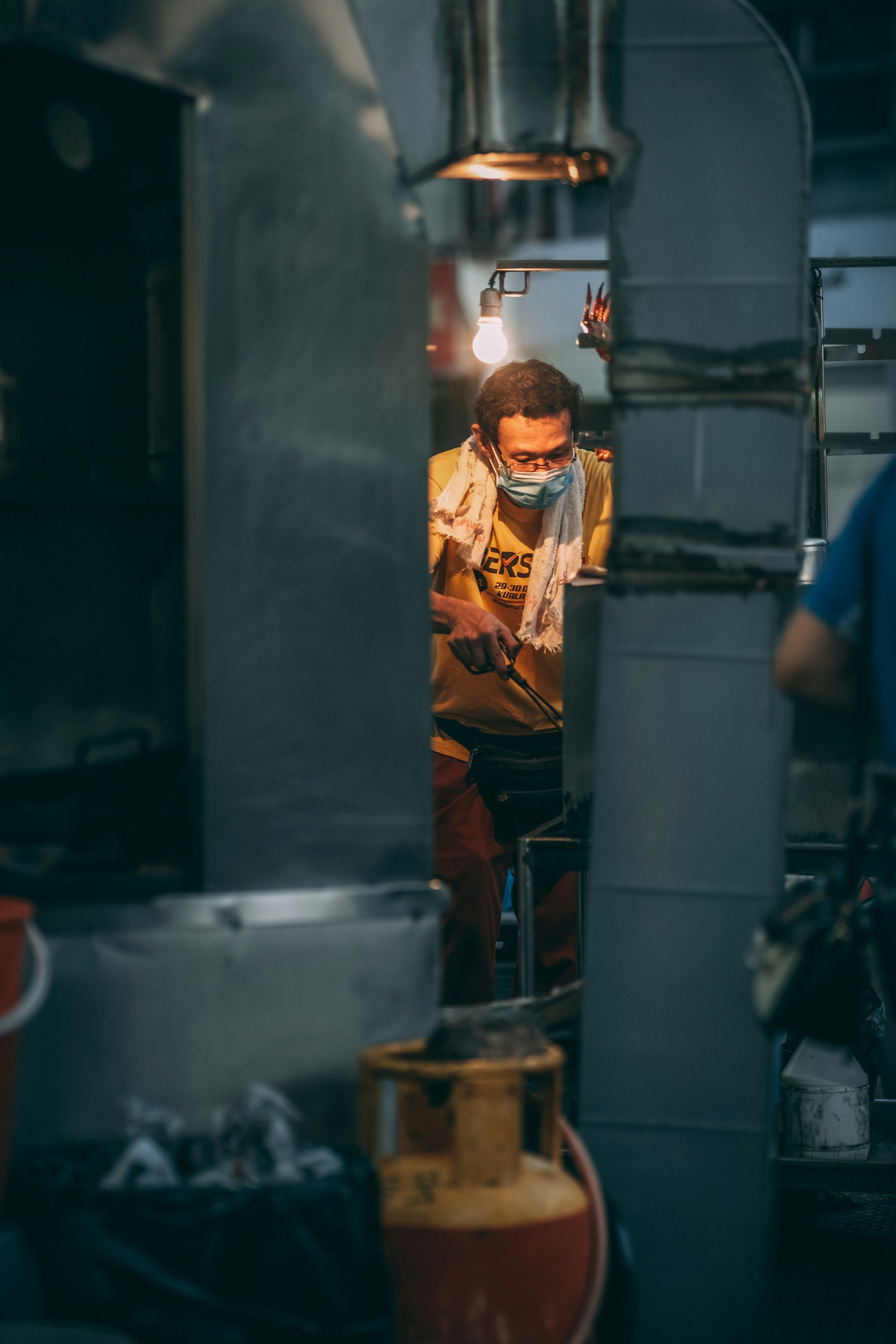 Keeping the hawker dream alive in times of a pandemic. Face masks made compulsory by law.