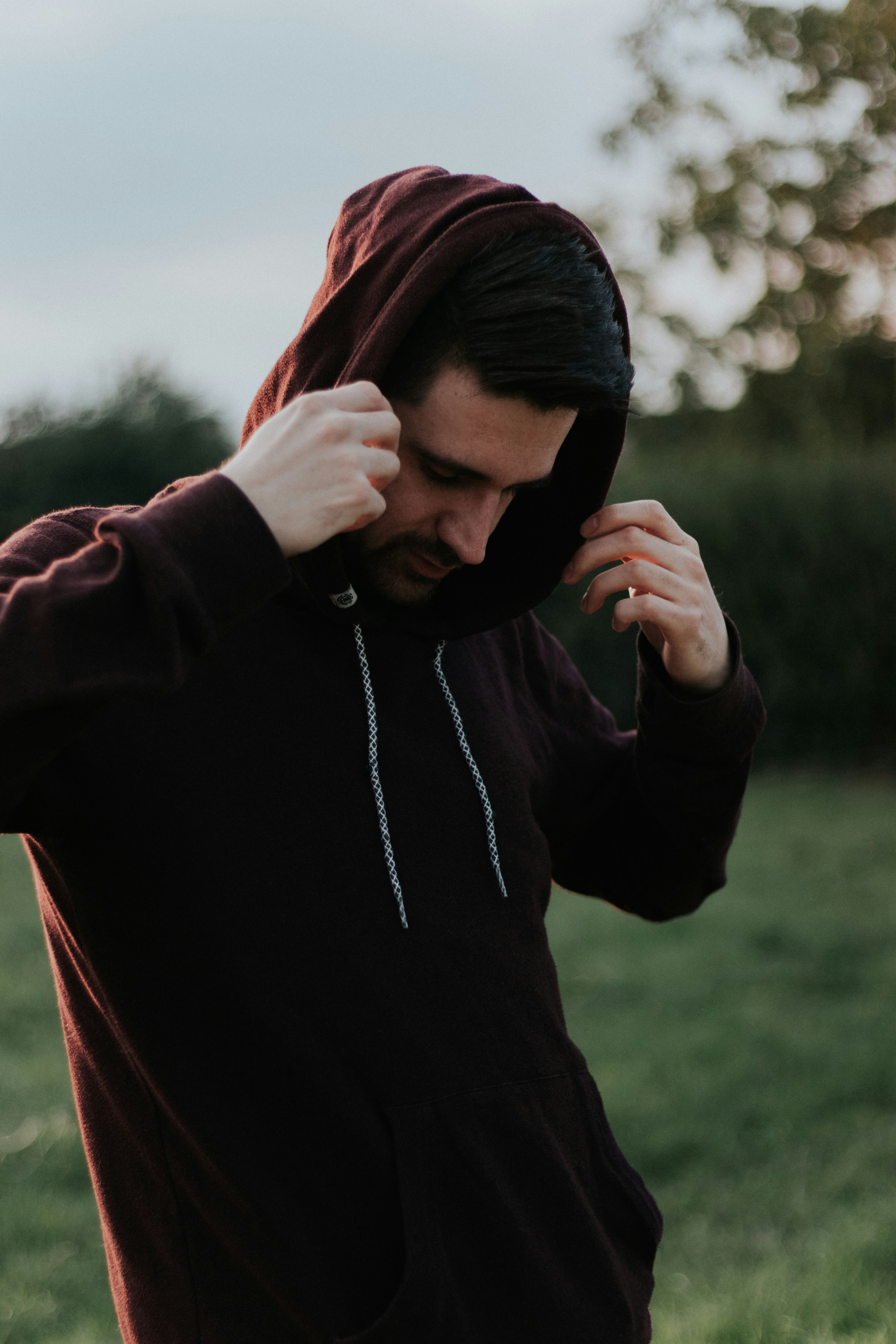 Woman in black jacket covering her face with her hands photo – Free ...