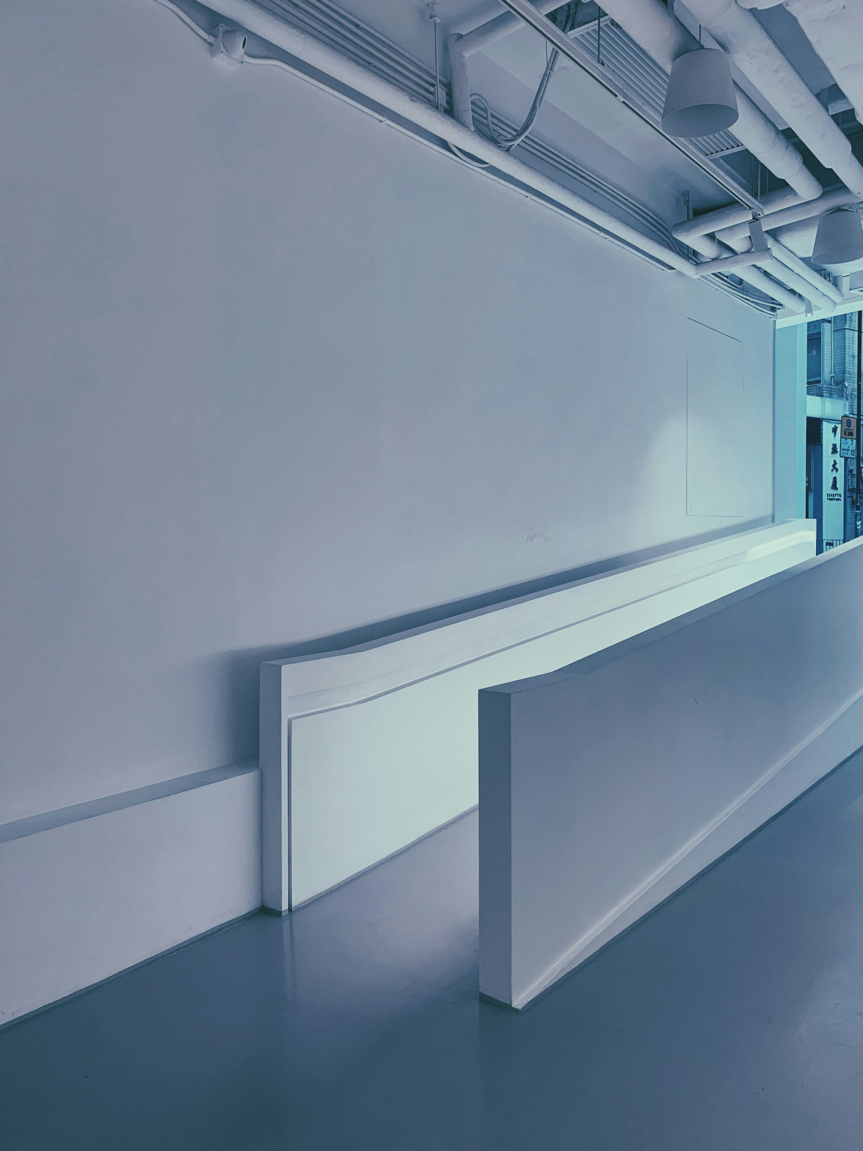Azure Silence: A Minimalist Corridor of Geometry and Light