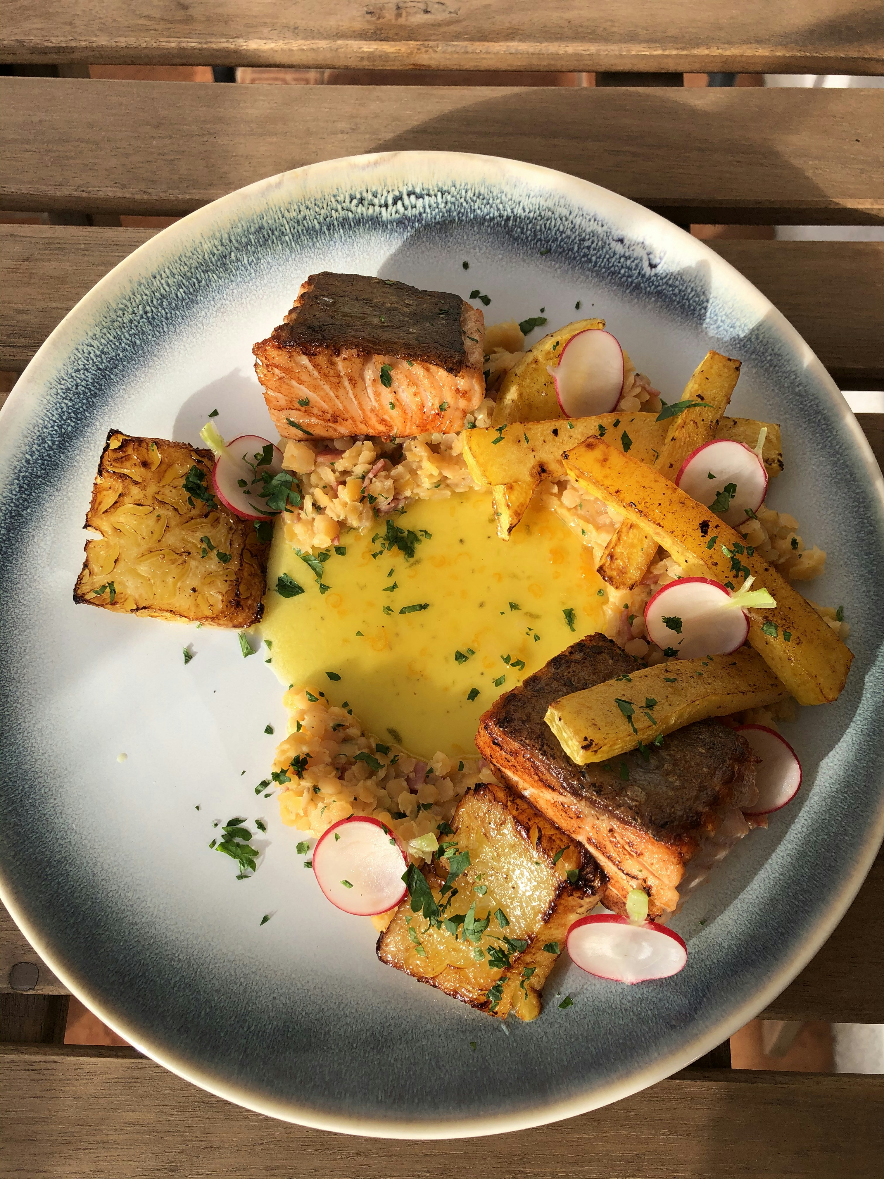 Sunlit Salmon Medley: Crisp Skin, Golden Potatoes, and Butter-Citrus Sauce