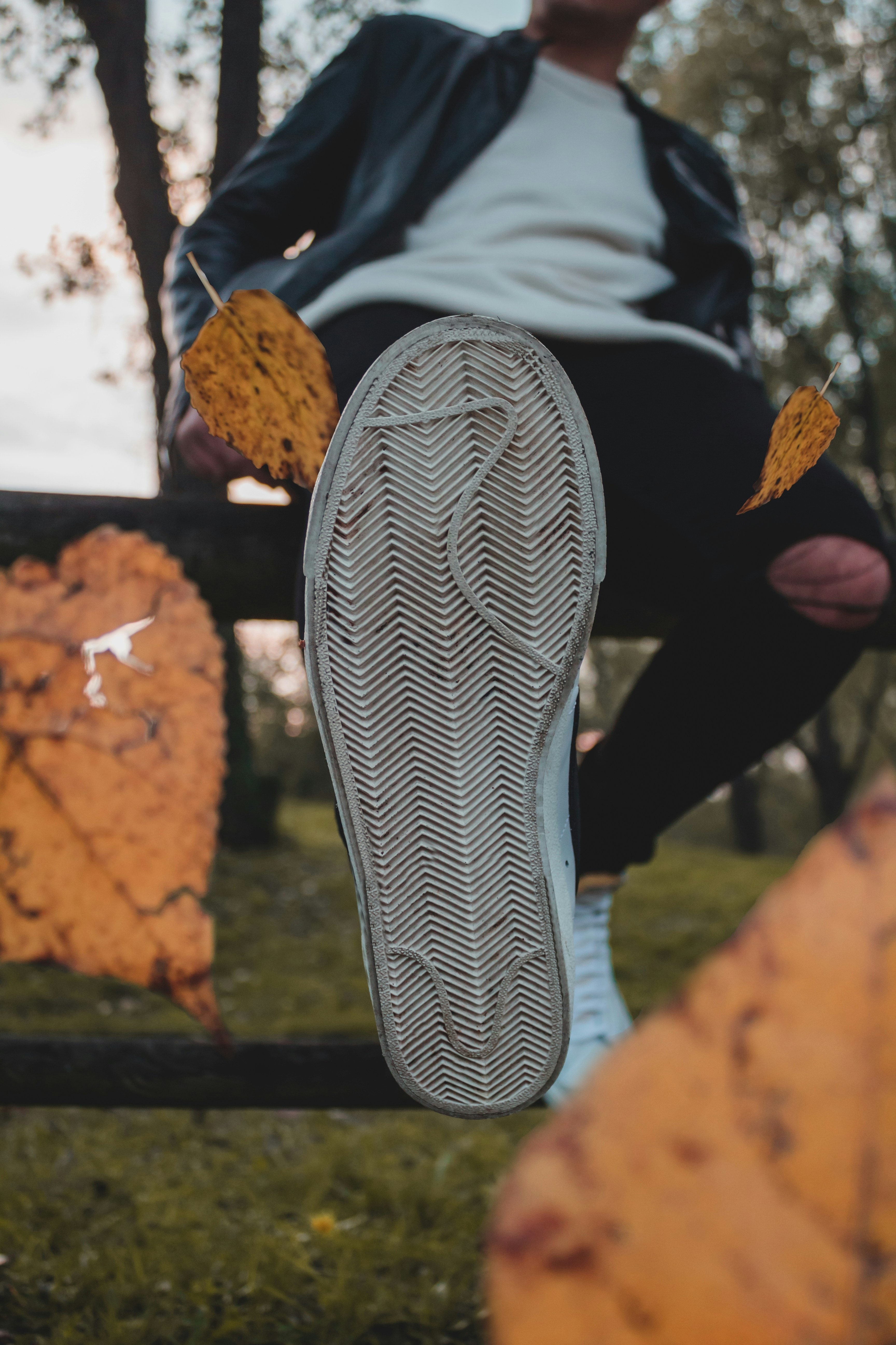 Close-Up Footing: A Sneaker Sole in Autumn Light