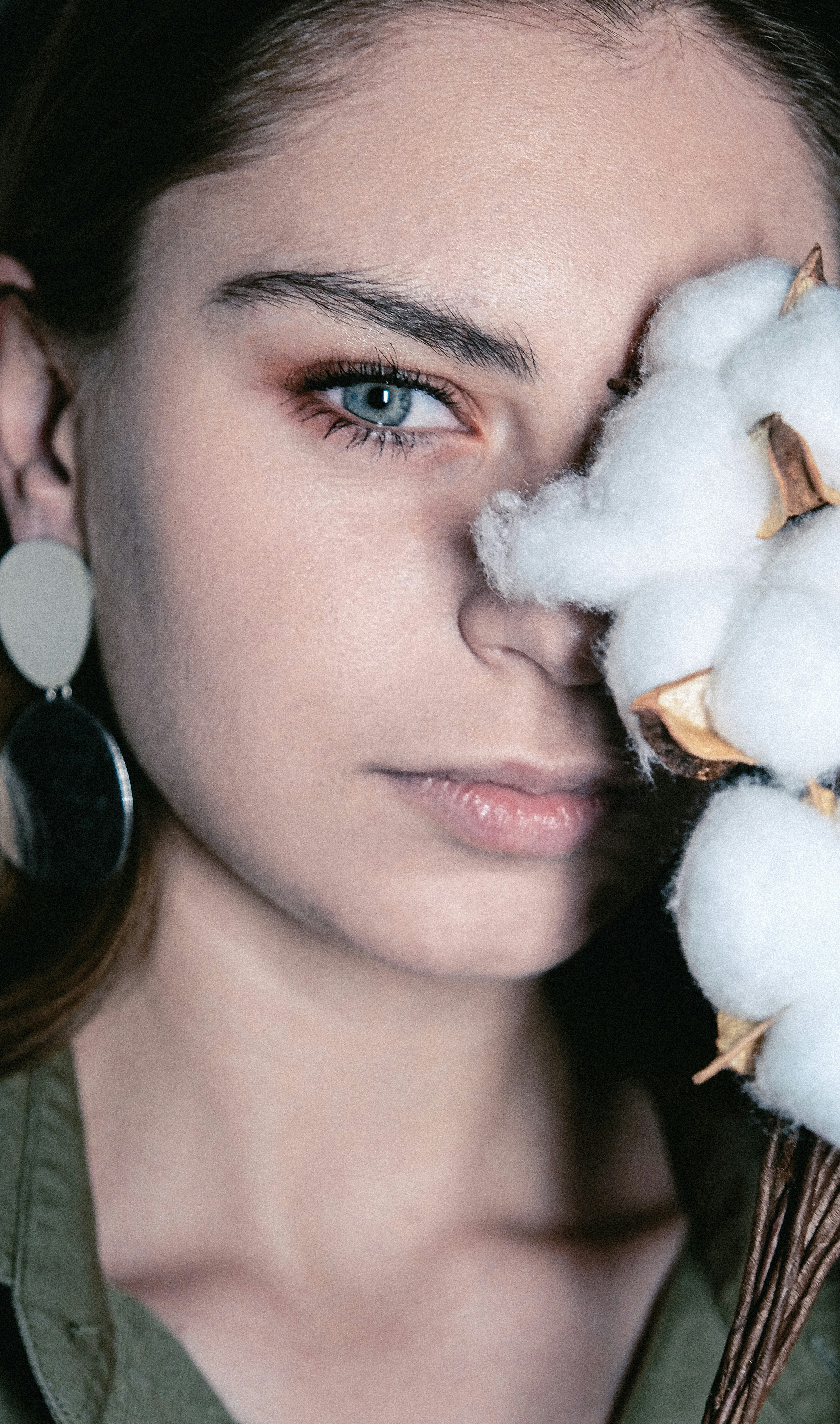Azure Eye Behind a Cotton Cloud