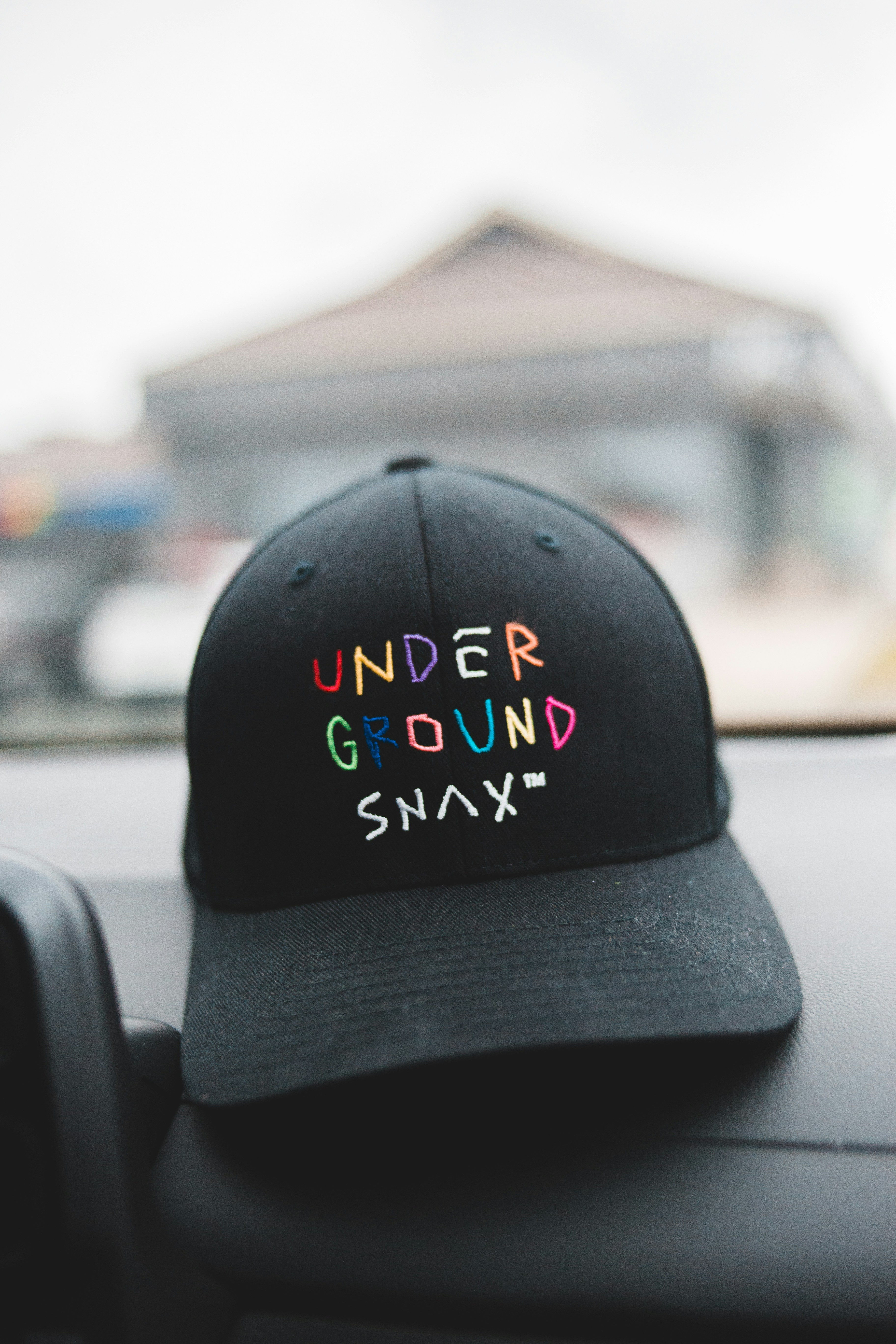 Black and yellow fitted cap photo – Free Grey Image on Unsplash