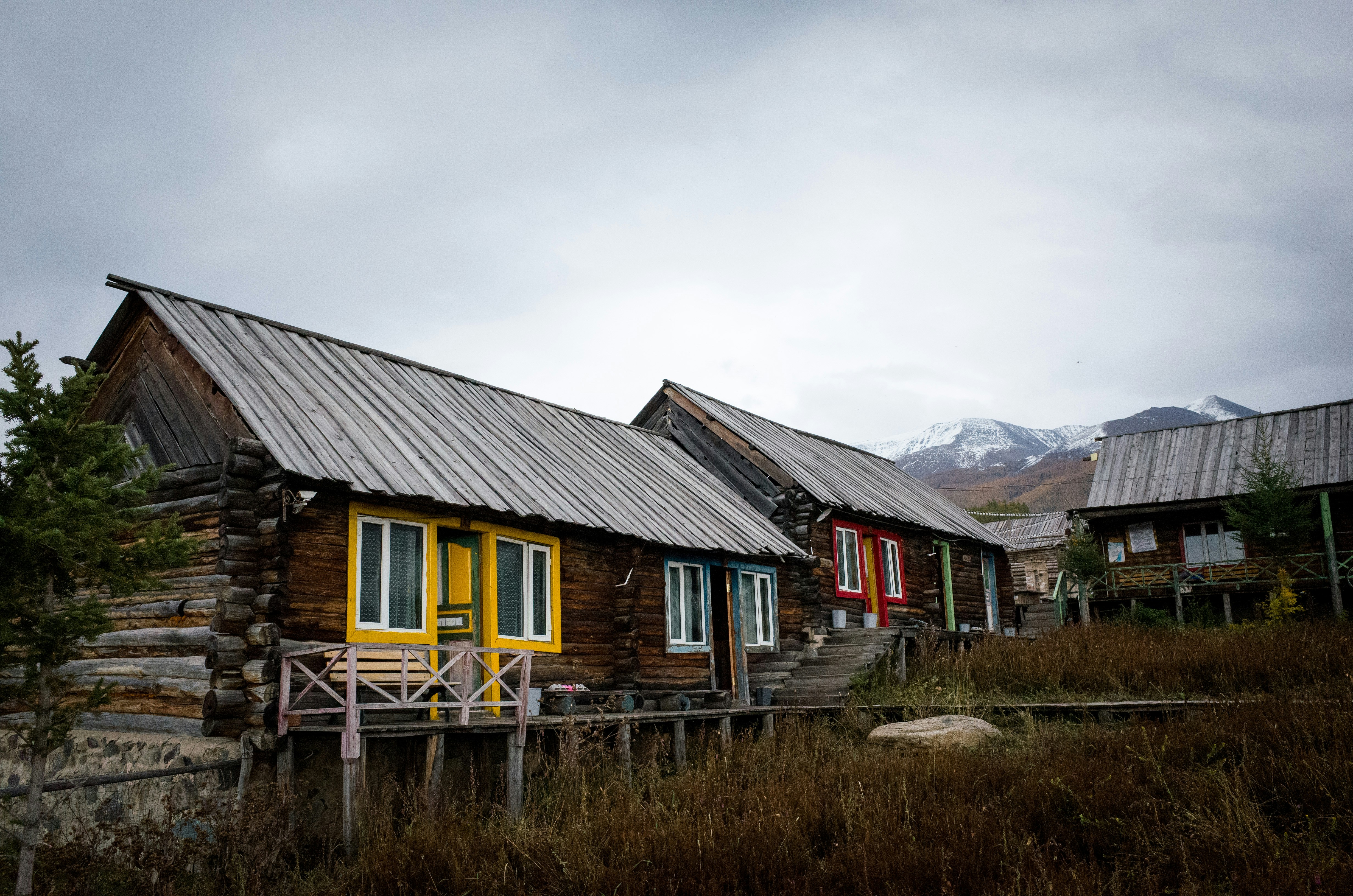 Colorful Cabins along a Weathered Ridge