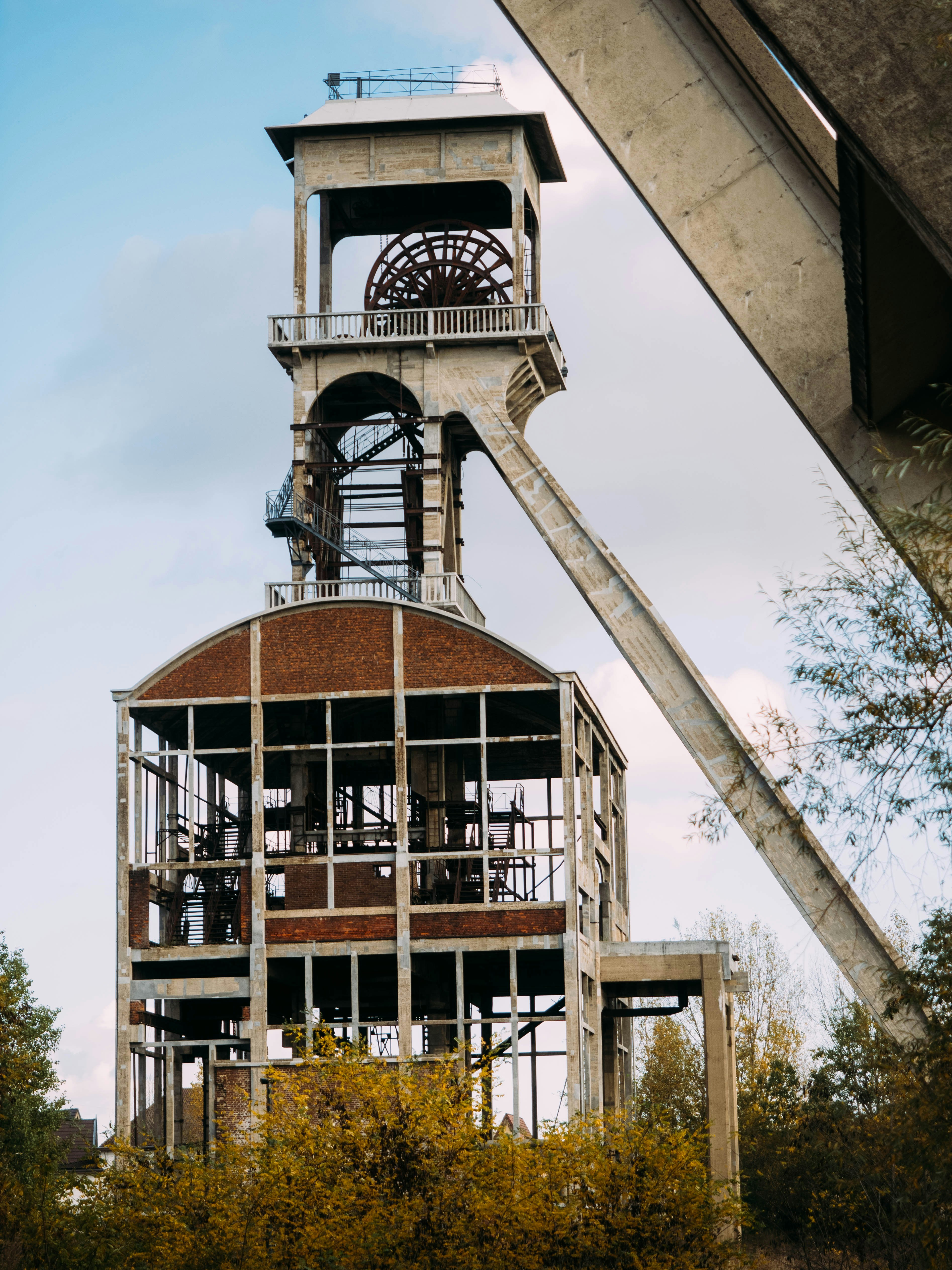Rust-Frame Sentinel: Autumn Light on a Dismantled Headframe