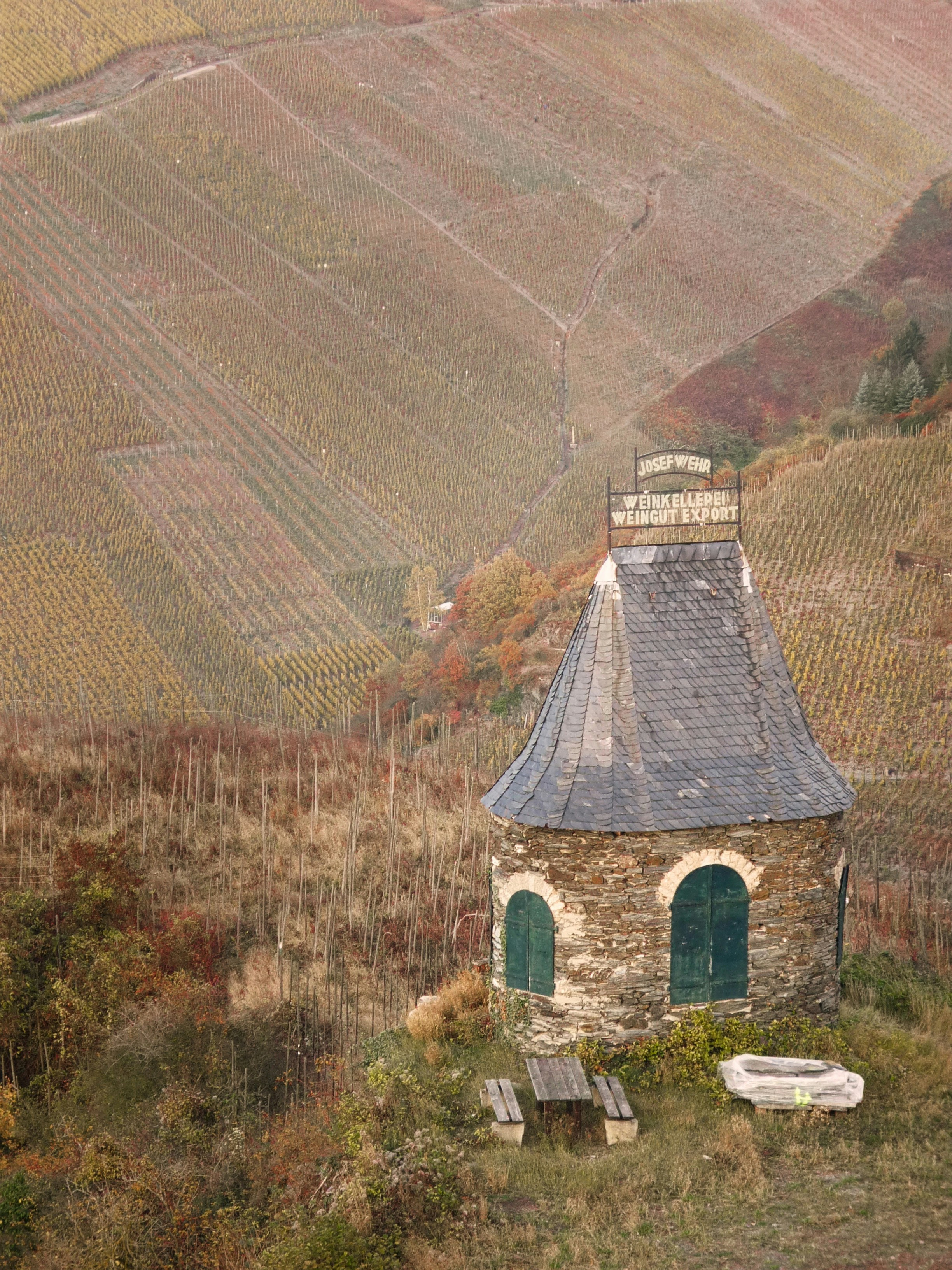 A small romantic structure stands overlooking the vineyards in the Moselle region