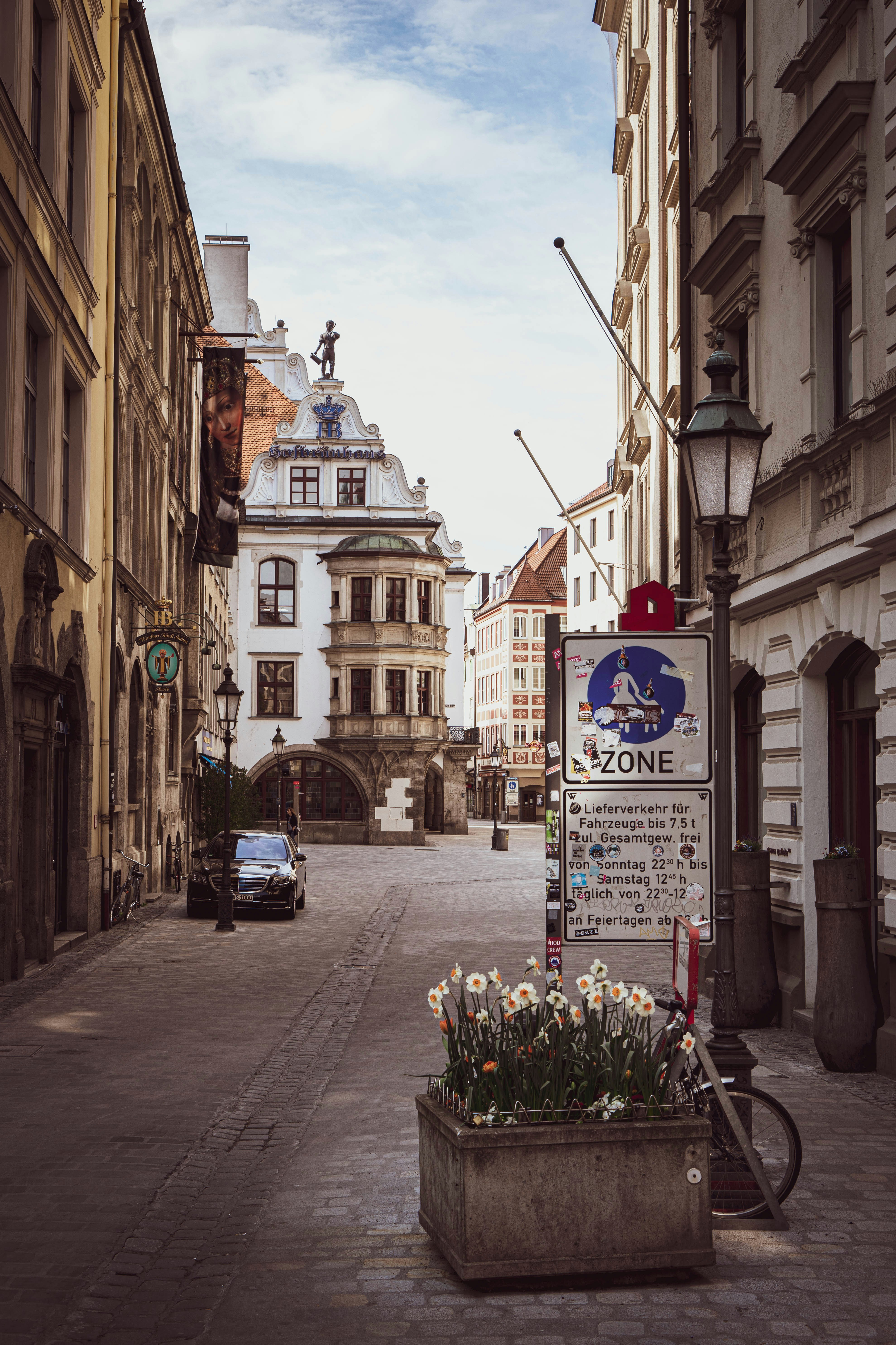 Cobbled Street Convergence: A Quiet European Thoroughfare