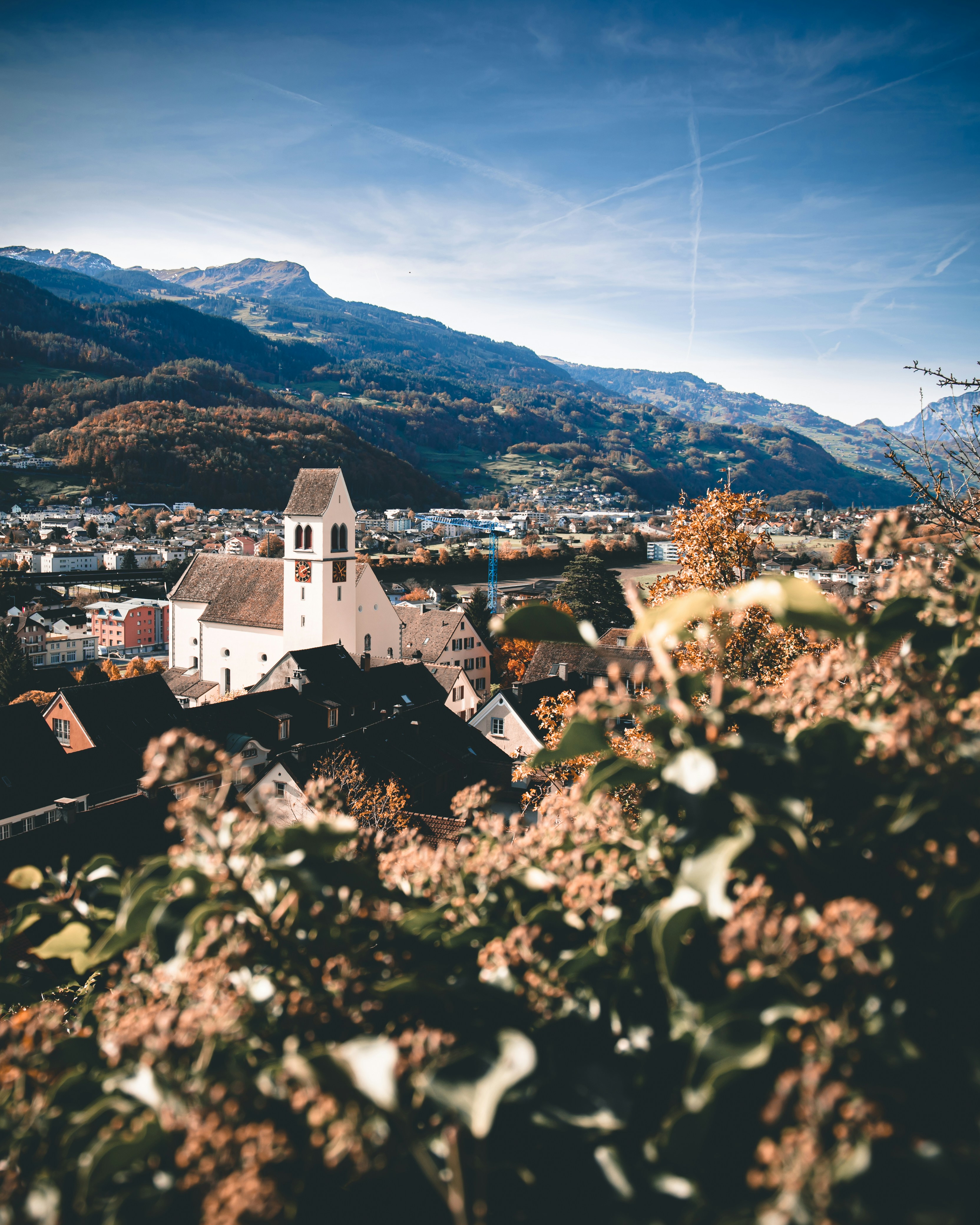Autumn Bell Tower Over an Alpine Village