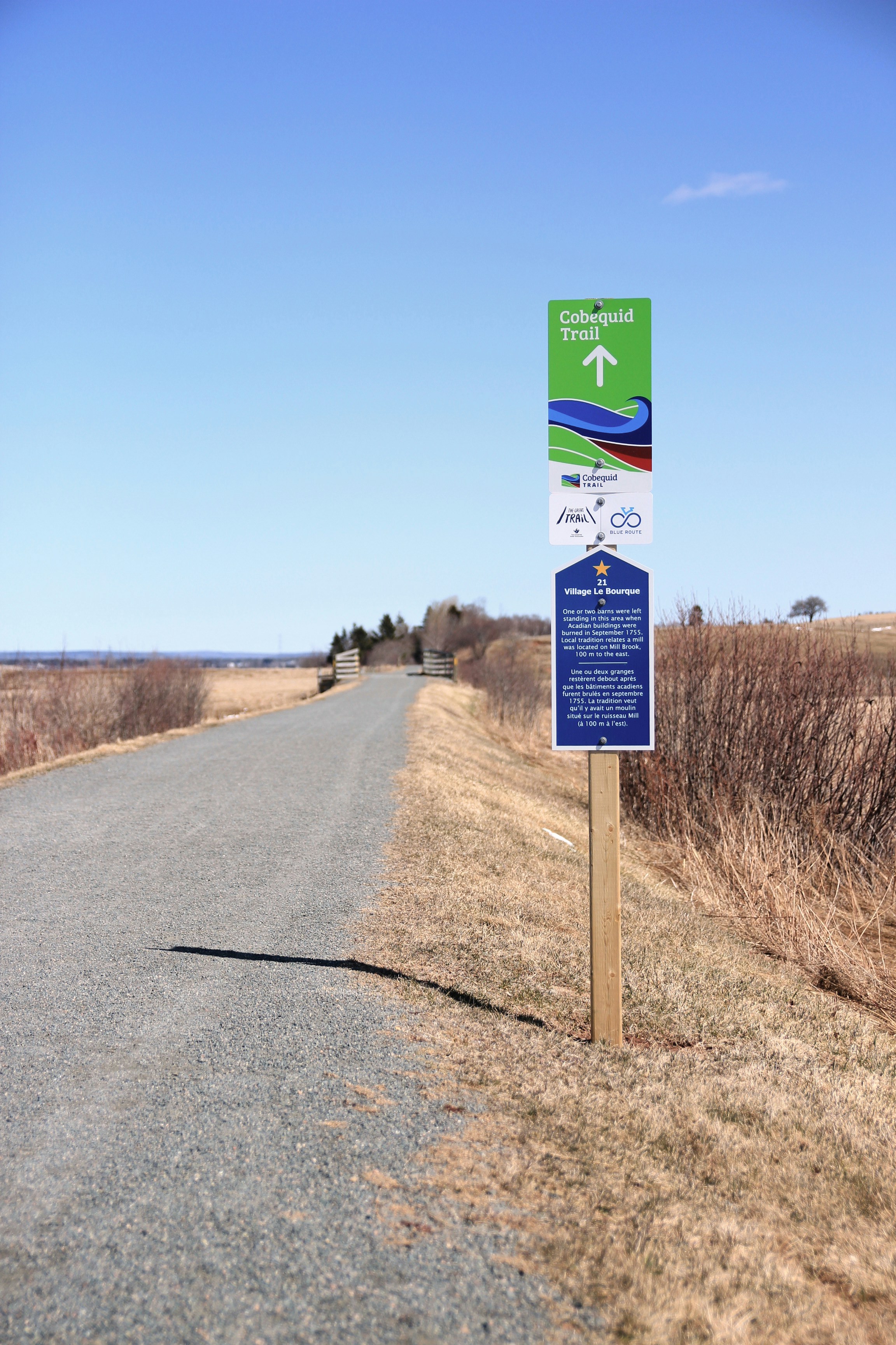 Cobequid Trail Signpost Over a Quiet Gravel Path